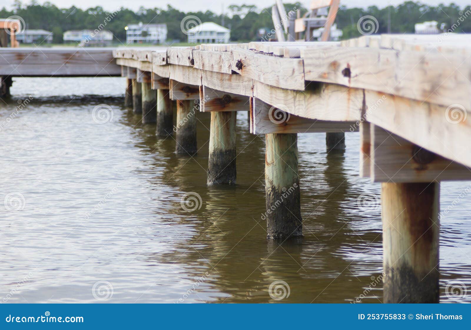 Wooden Dock with Water and Pilings Stock Image - Image of lake ...