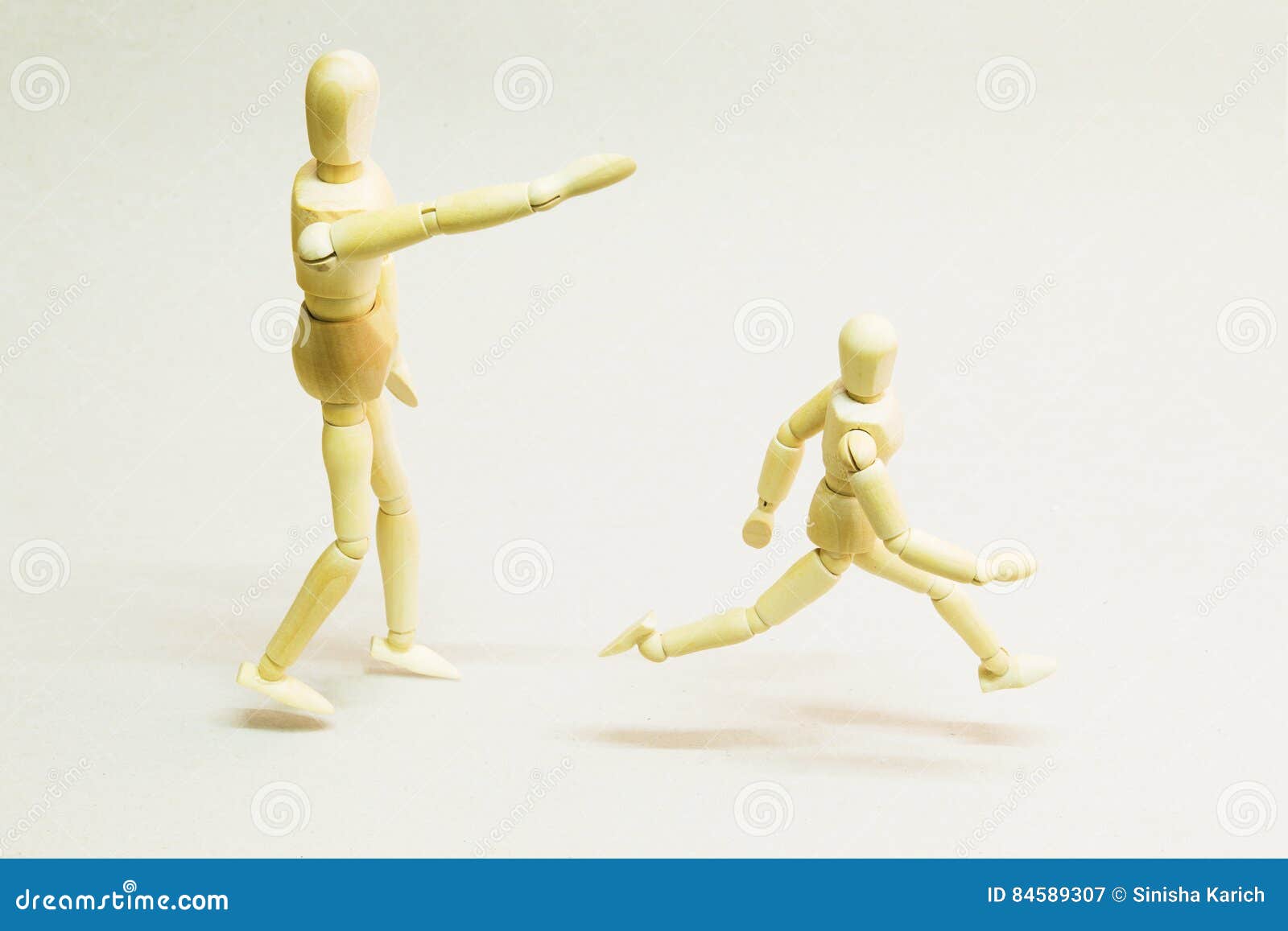 Wooden Doll in Action stock image. Image of legs, concept - 84589307