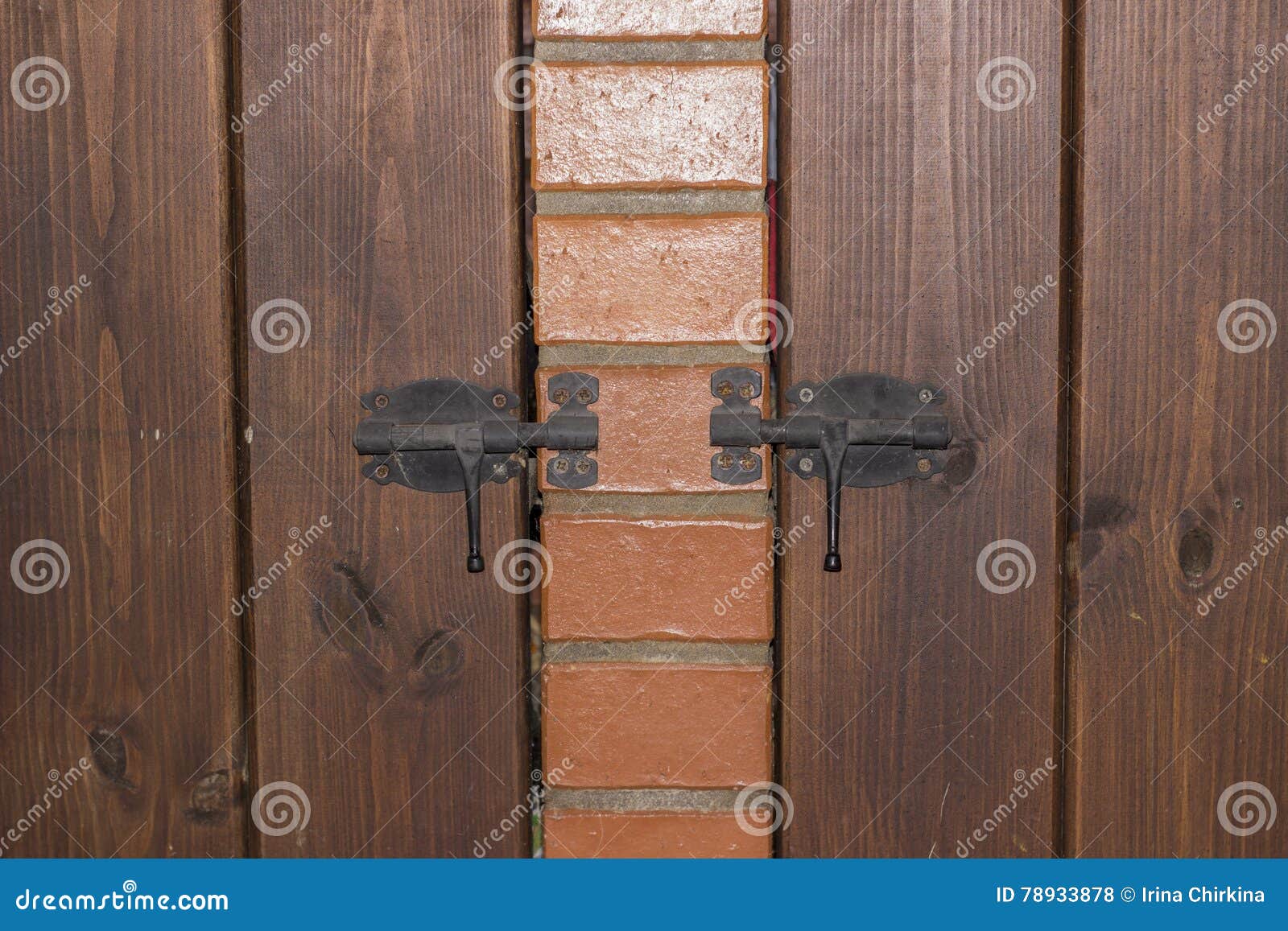 Wooden door on the latch stock photo. Image of brick - 78933878