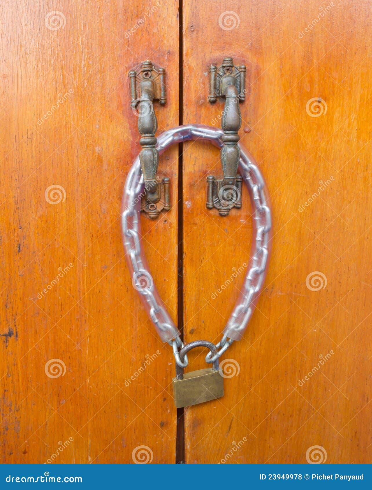 Wooden doors are locked stock photo. Image of closeup - 23949978