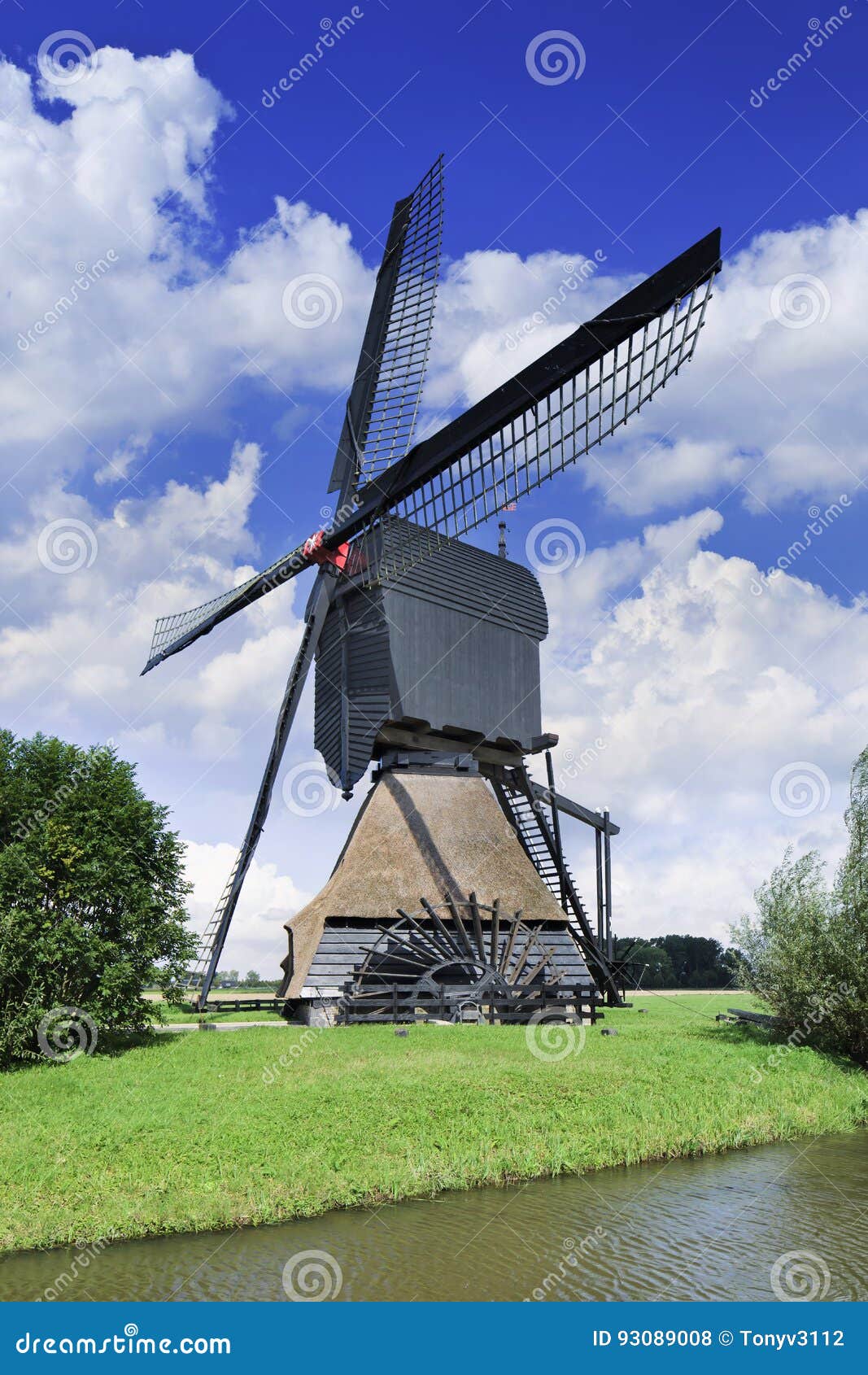 Drainage Windmill With Thatched Roofing In A Polder With Dramatic ...
