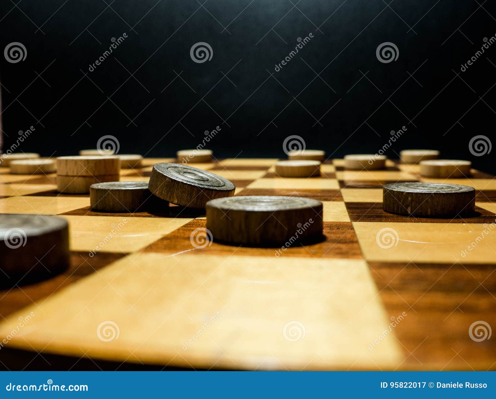 Wooden Draught Pieces on a Wooden Chessboard Stock Image - Image of ...