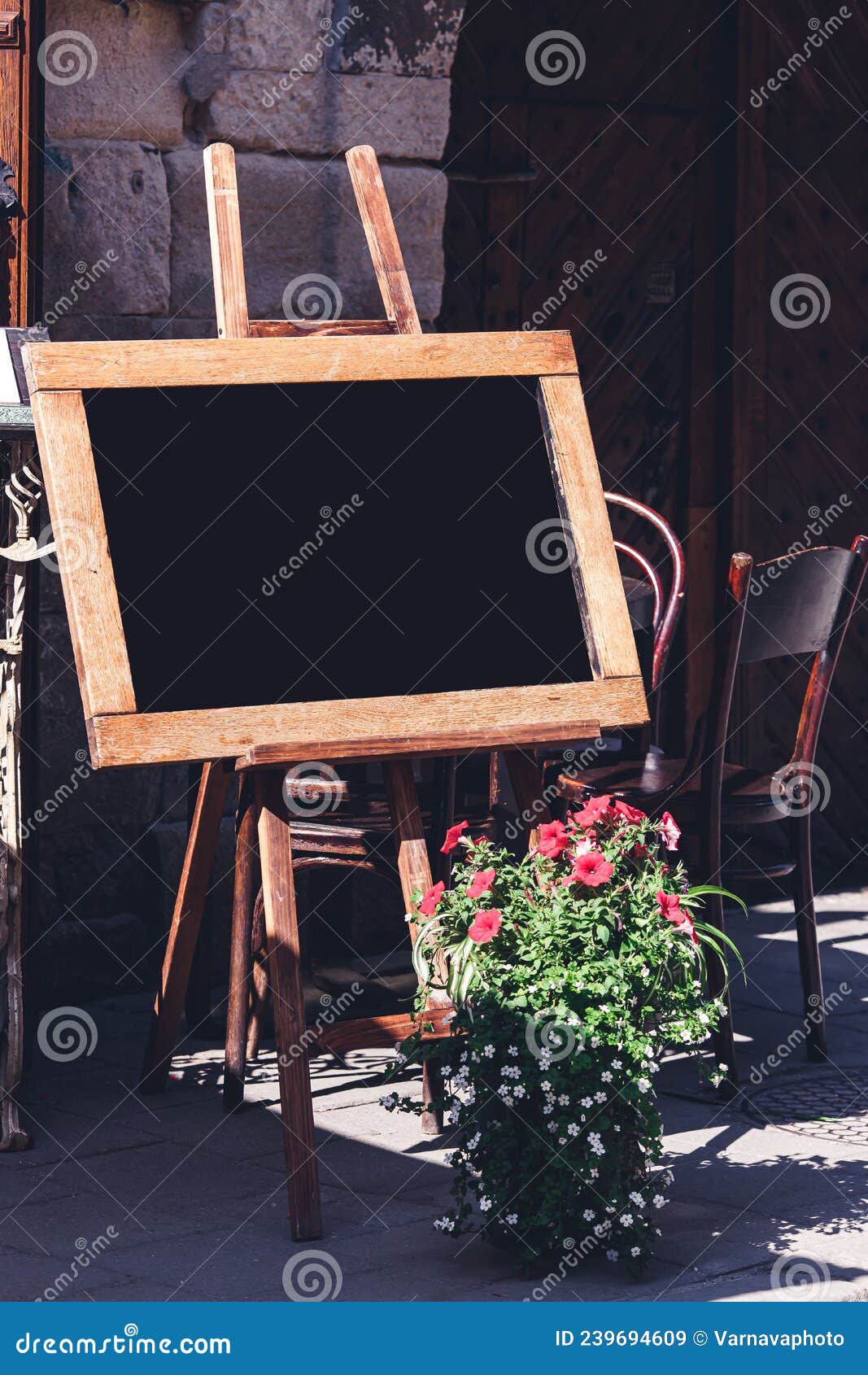Wooden Easel Outside Restaurant with Empty Black Space for Your Mockup ...