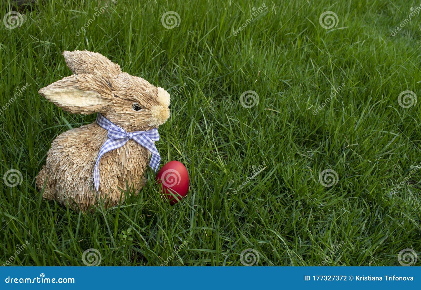 Wooden Easter Bunny with Red Egg on Real Grass Background Stock Photo ...