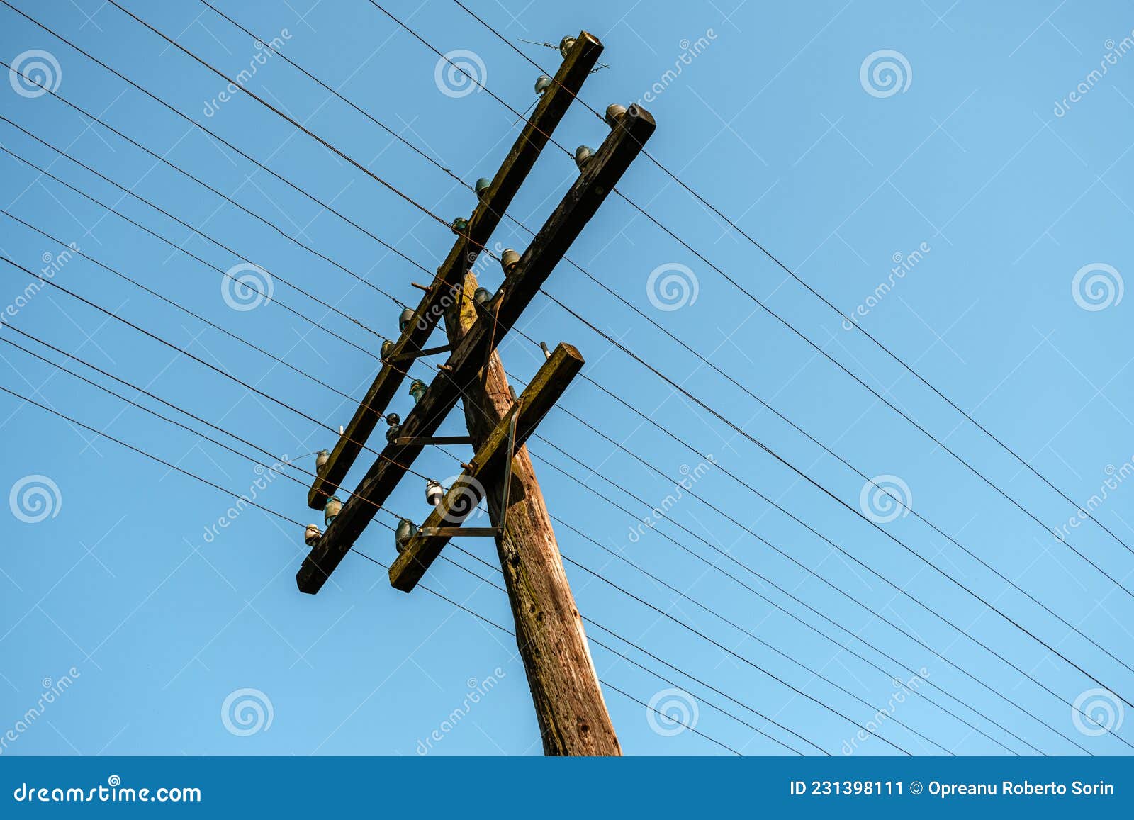 A Wooden, Electric Pole by the Railroad Tracks Stock Image - Image of ...