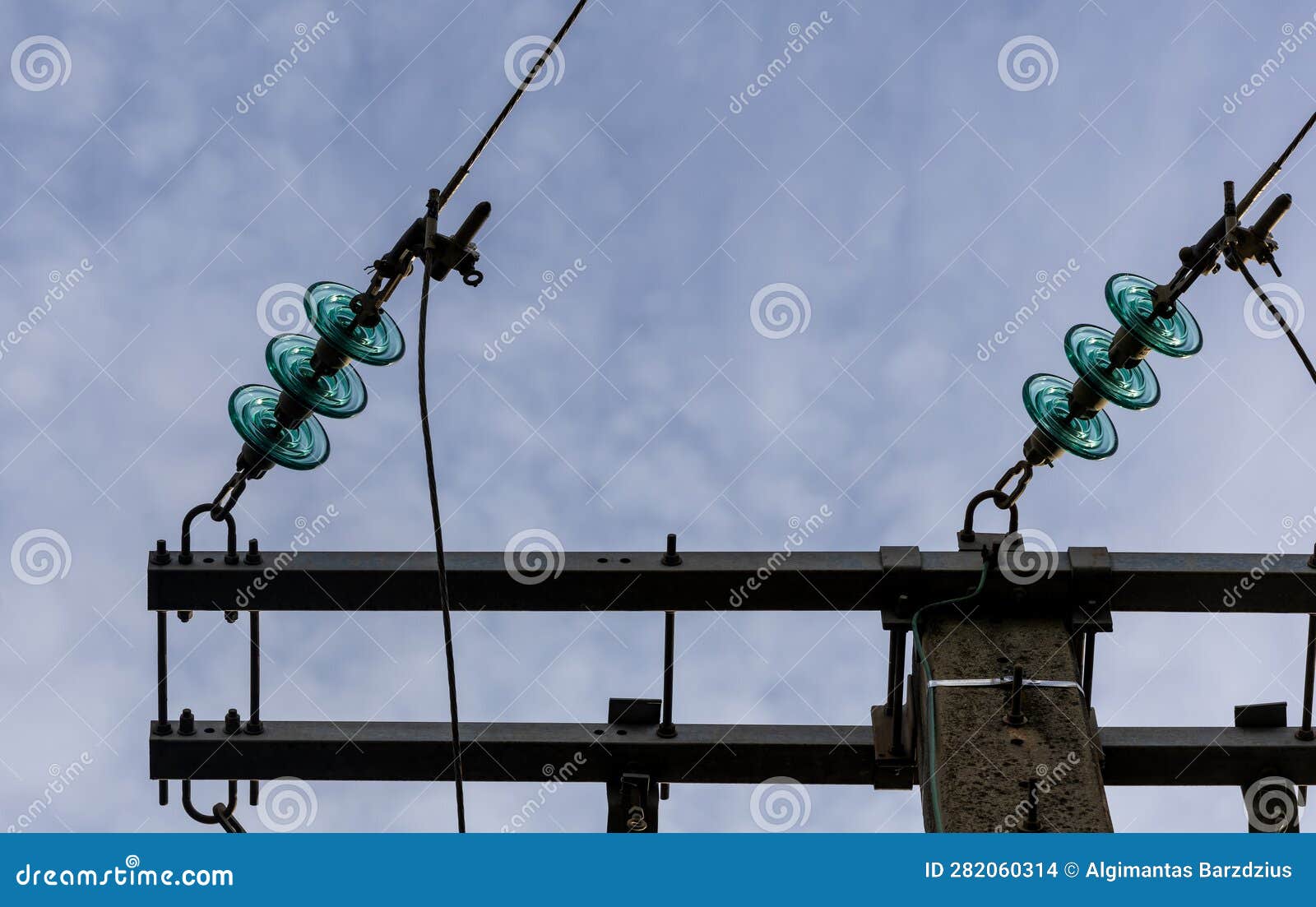 A Wooden Electricity Pole with Green Insulators Stock Photo - Image of ...
