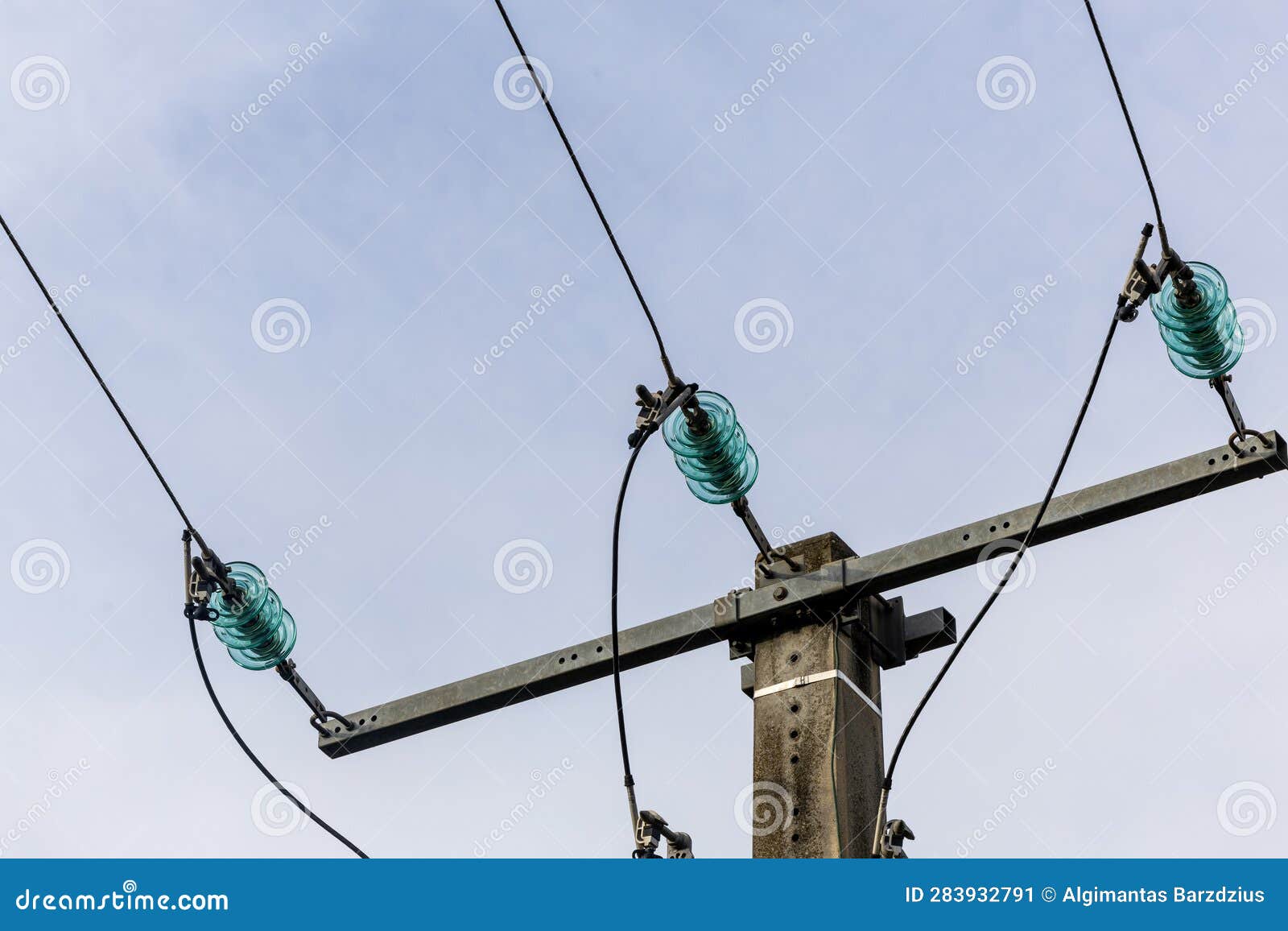 A Wooden Electricity Pole with Green Insulators Stock Image - Image of ...