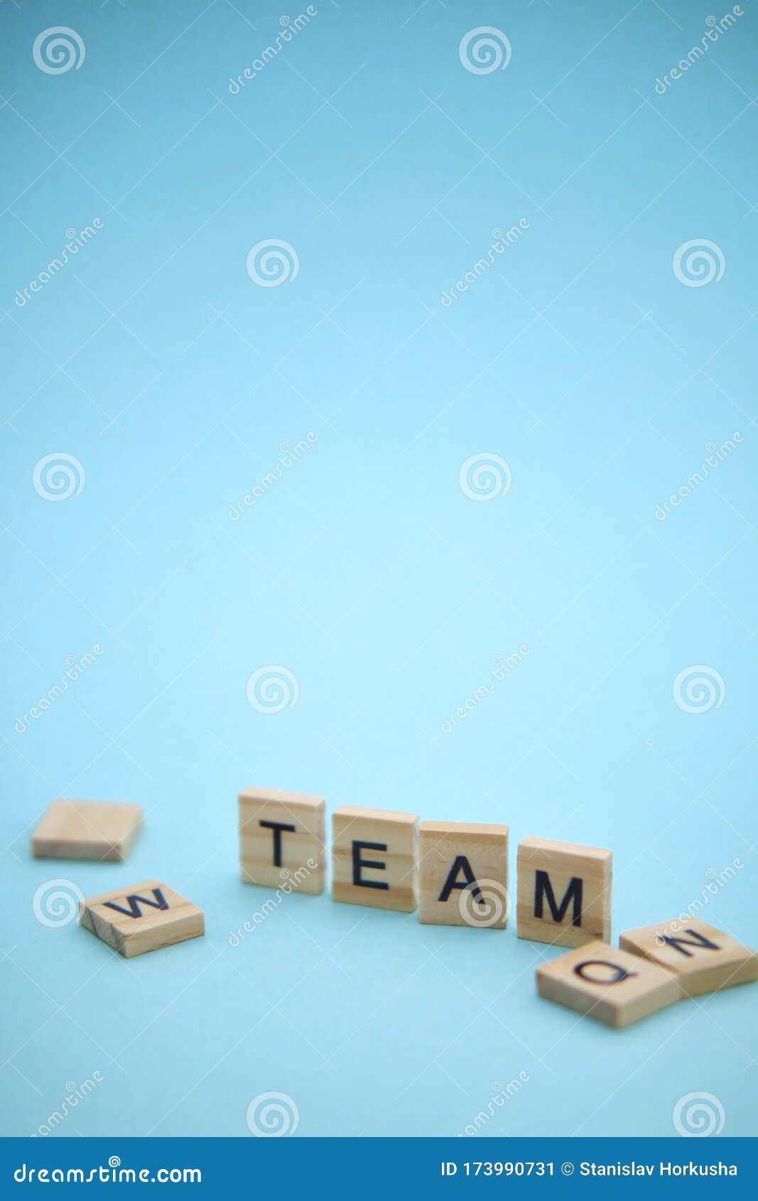 Wooden Elements with Letter on Bright Blue Background Spelling Word ...