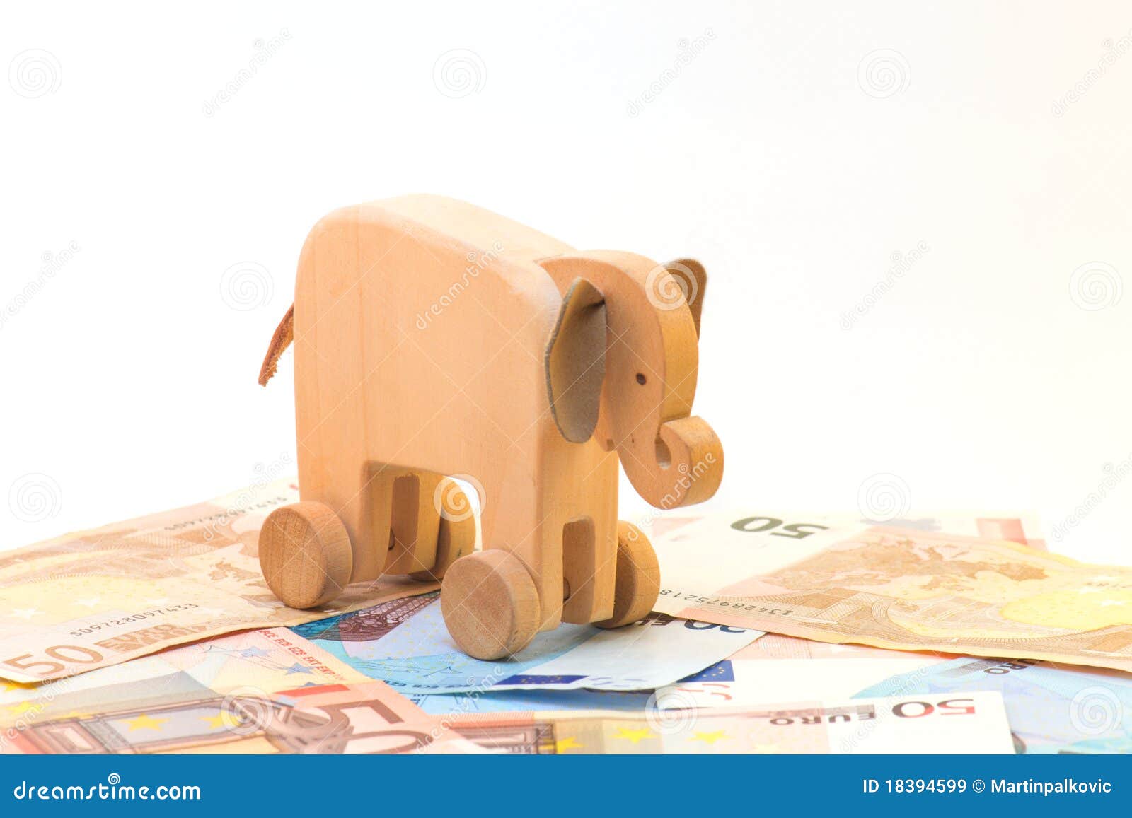 Wooden elephant with money stock image. Image of glow - 18394599