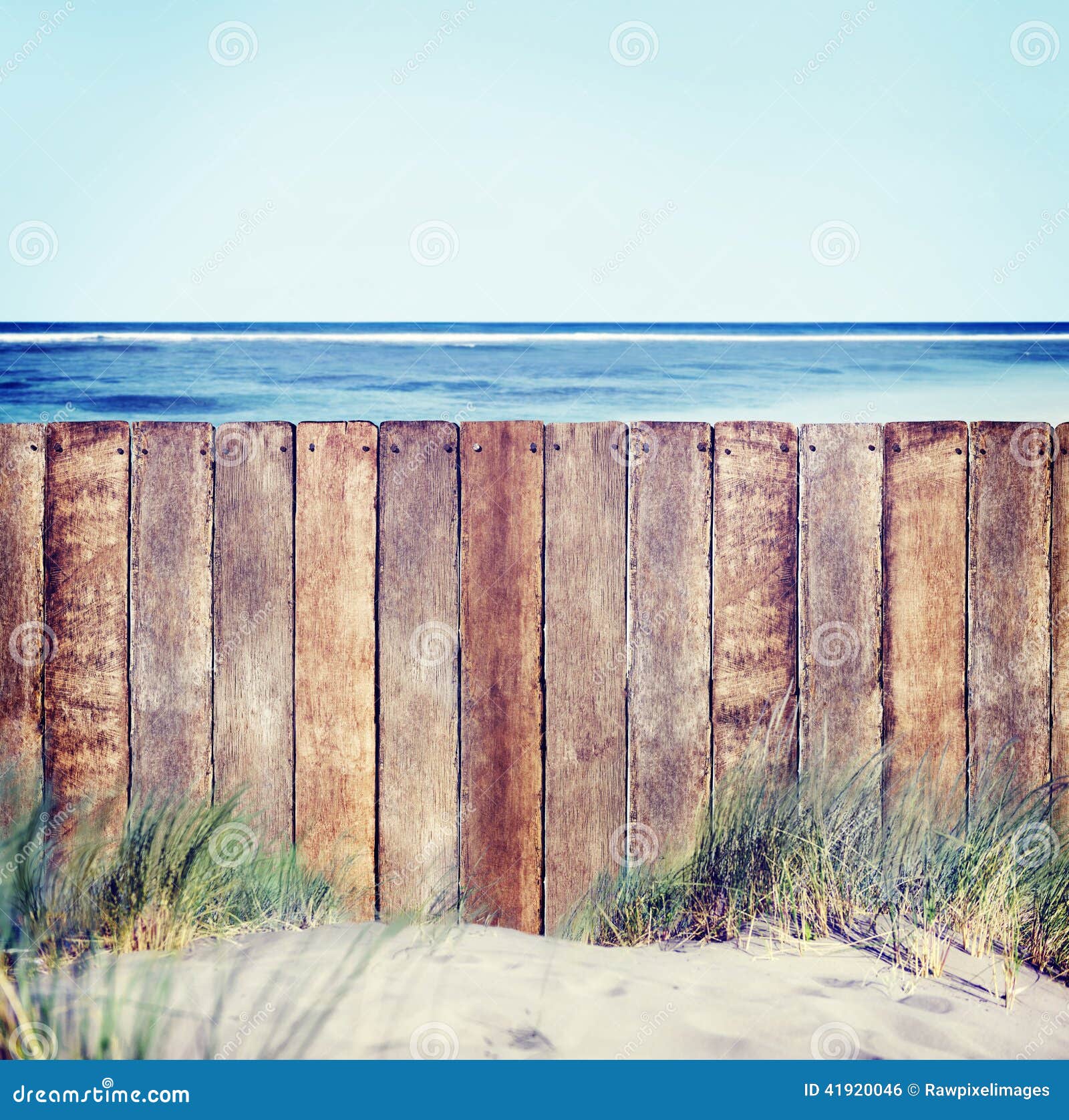 Wooden Fence on the Beach stock photo. Image of deck - 41920046