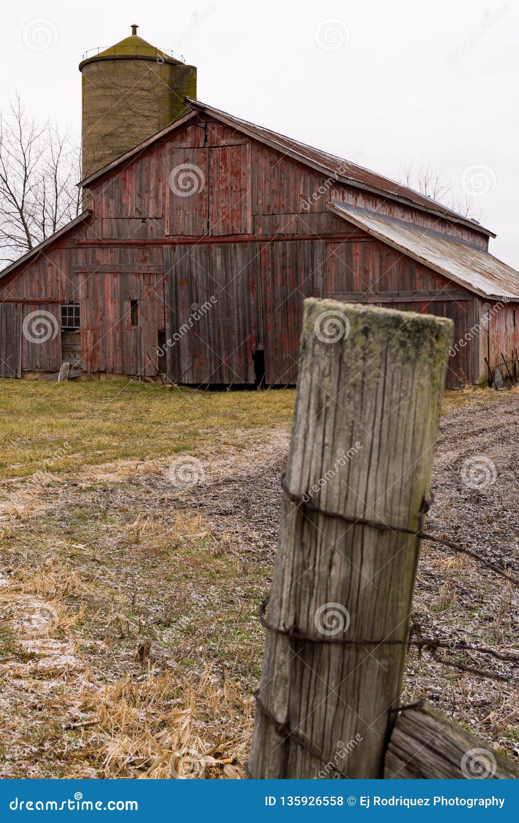 Wooden post and old barn stock photo. Image of cloudy - 135926558