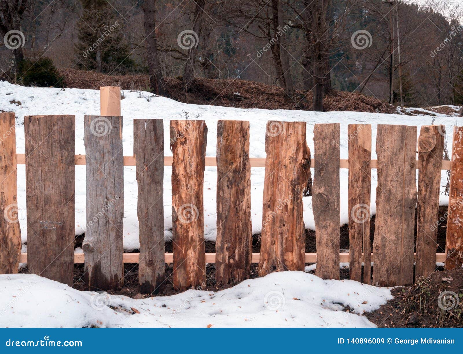 Wooden fence with snow stock image. Image of concept - 140896009