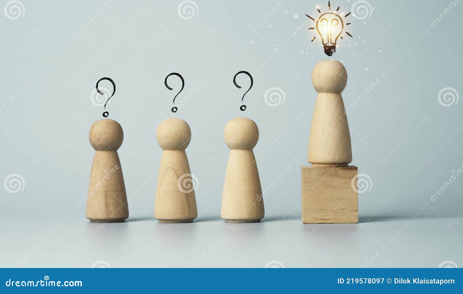 Wooden Figure with Drawing Light Bulb on Cube among Other Wooden with ...