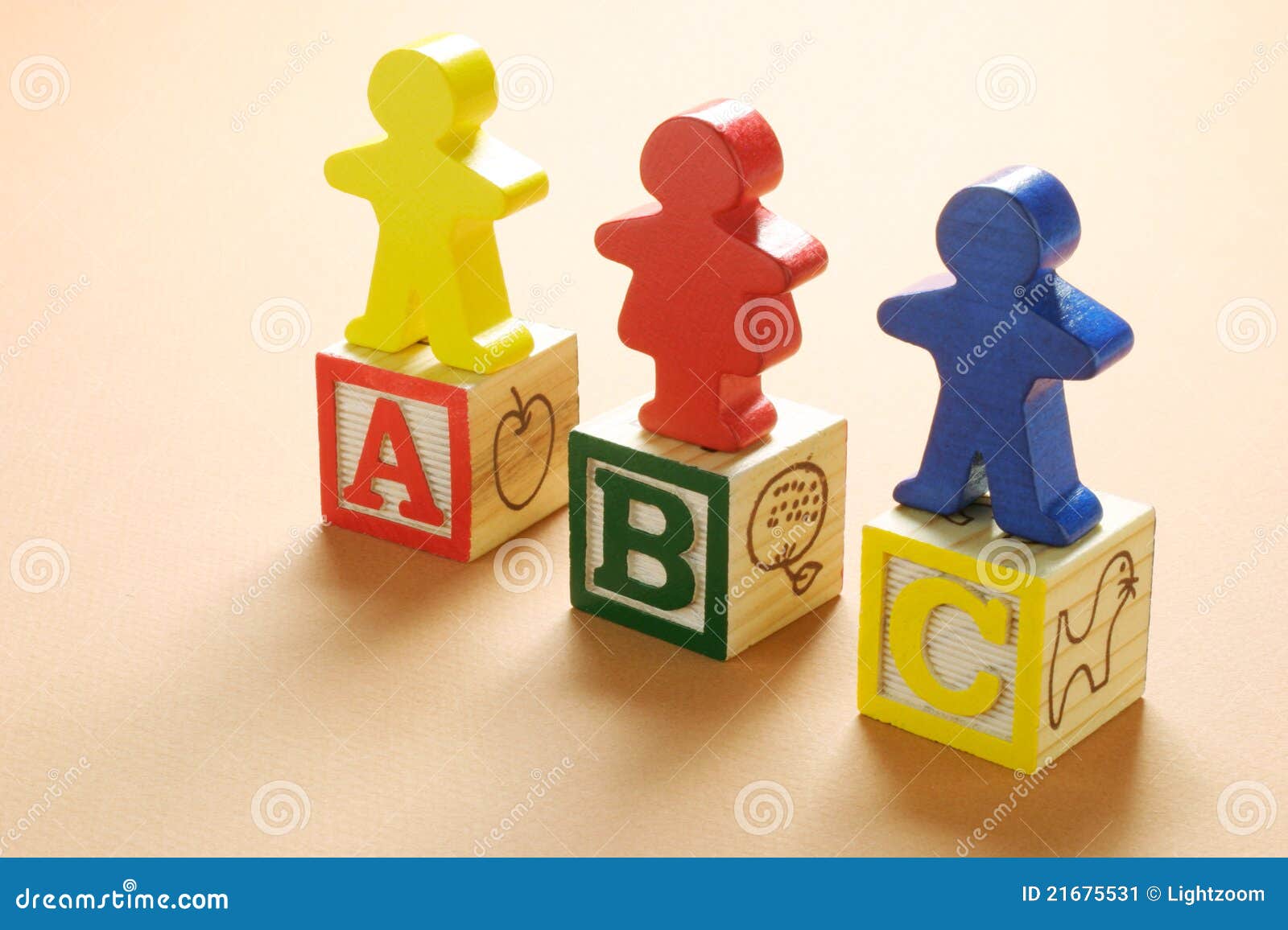 Wooden Figures and Alphabet Cubes Stock Image - Image of standing ...