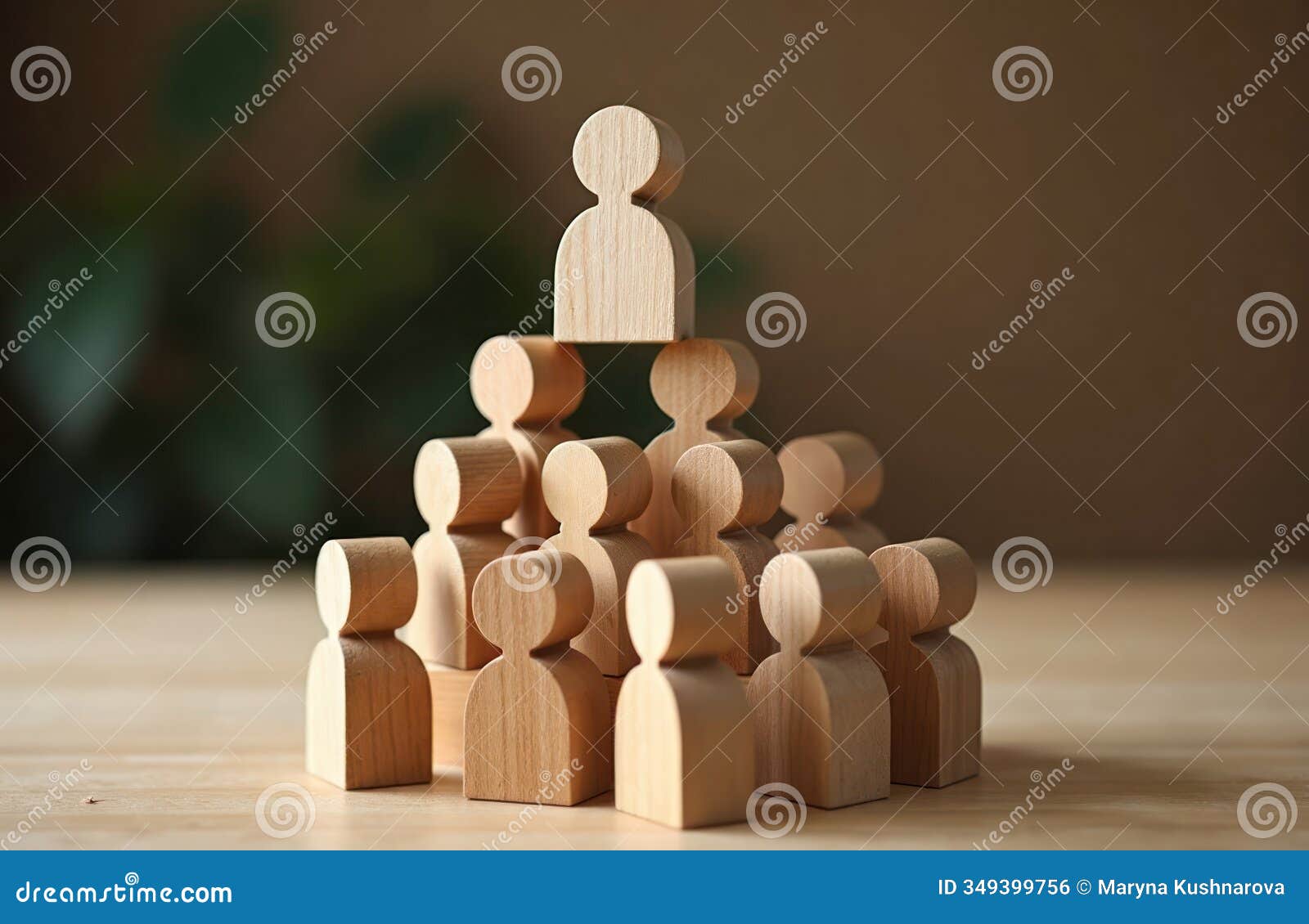 Wooden Figures Create Pyramid Shape. Leadership, Teamwork Concept ...