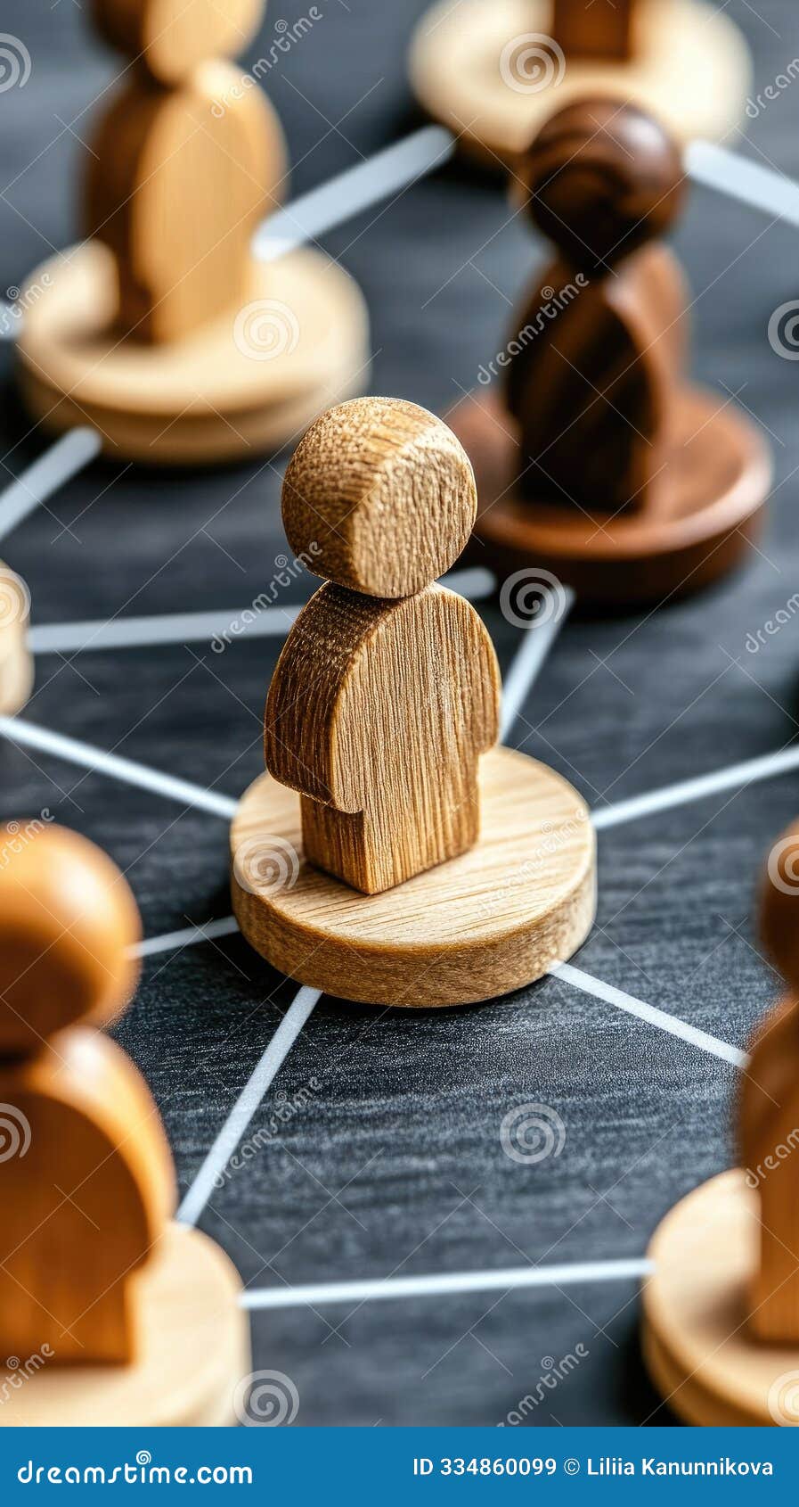 Wooden Figures Representing People are Interconnected by White Lines on ...