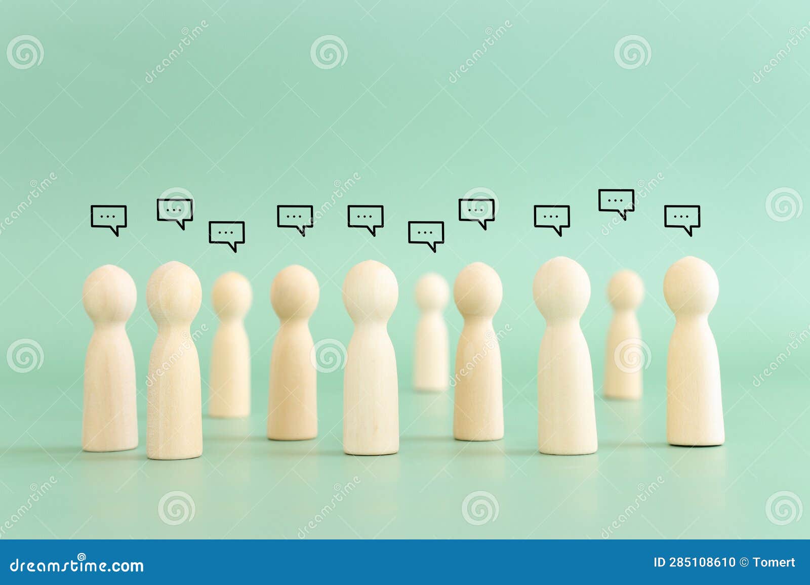 Wooden Figures with Speech Bubbles. Concept of Communication ...