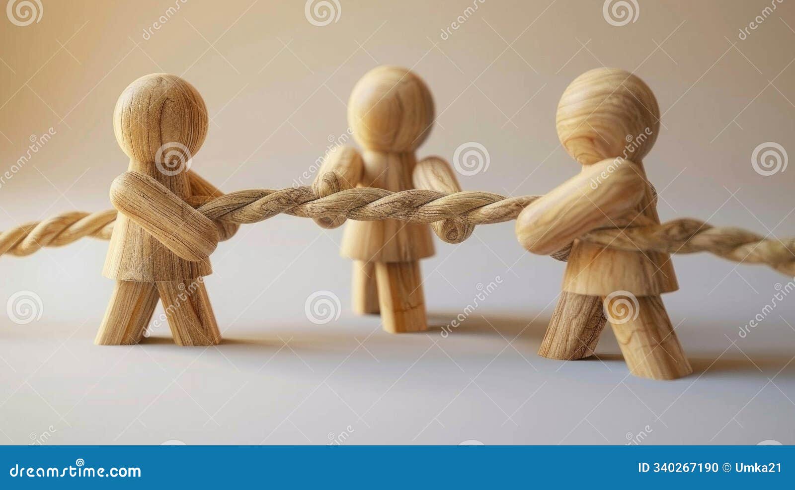 Wooden Figures in Tug of War: Symbol of Cooperation and Competition ...
