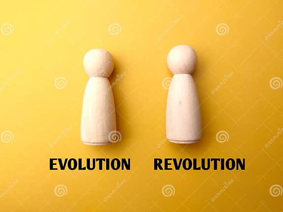 Wooden Figures with the Word EVOLUTION REVOLUTION Stock Photo - Image ...