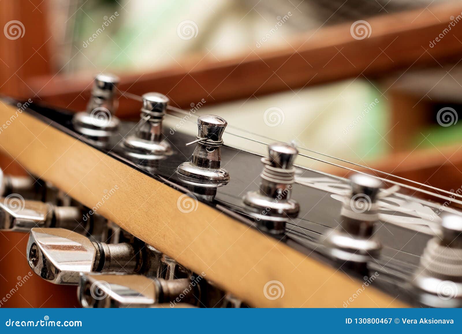Wooden Fingerboard of the Guitar, Pegs and Strings Close-up Stock Image ...