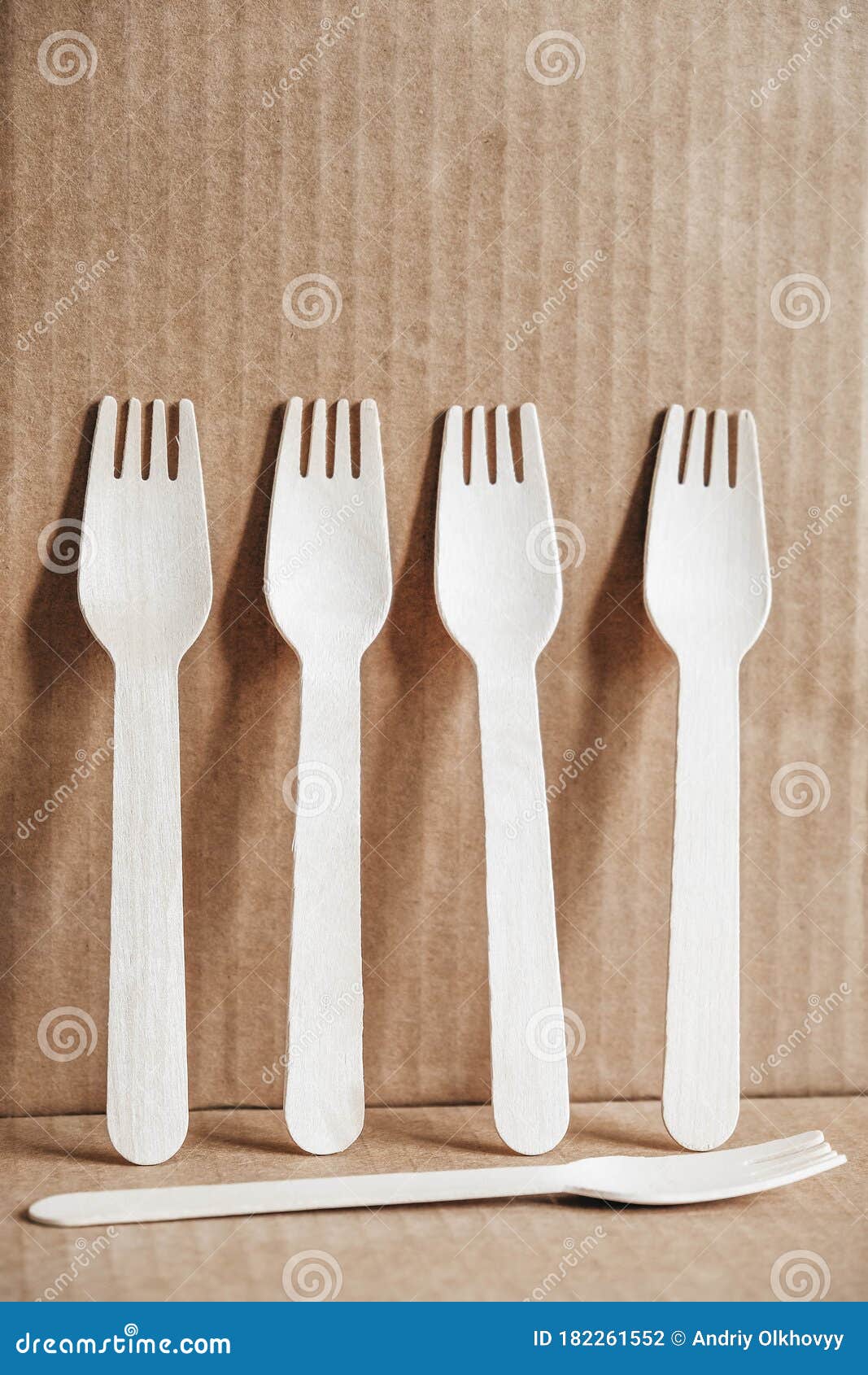 Wooden Forks on a Cardboard Background. Eco Friendly Disposable ...