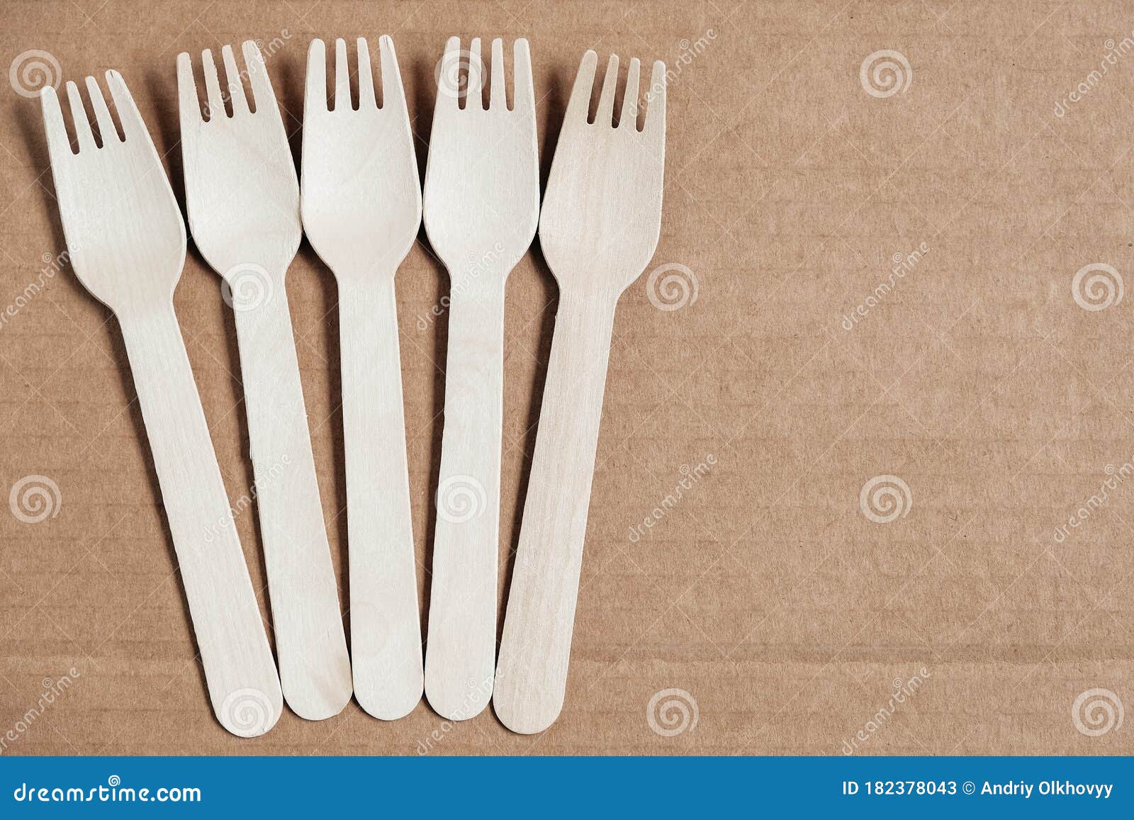Wooden Forks on a Cardboard Background. Eco Friendly Disposable ...