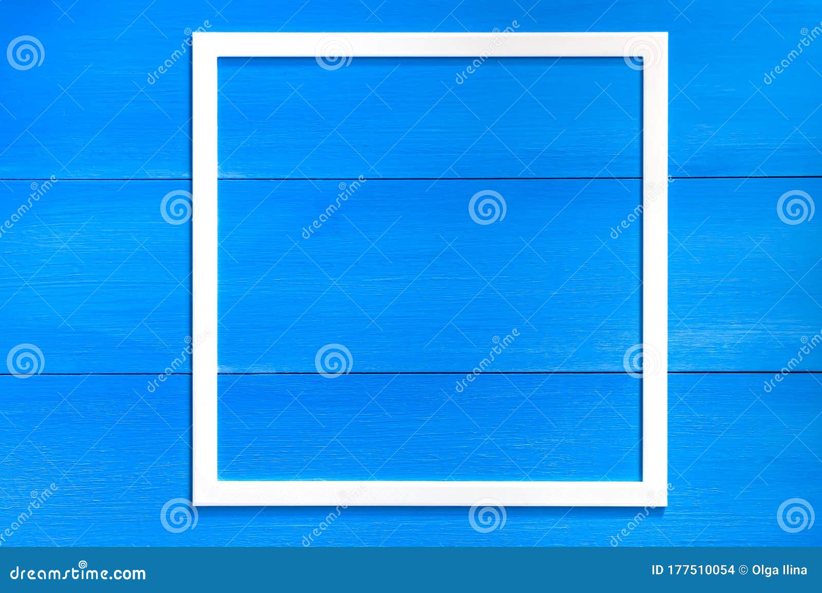Wooden Frame on a Blue Background. Blank Photo Frame Isolate. Stock ...