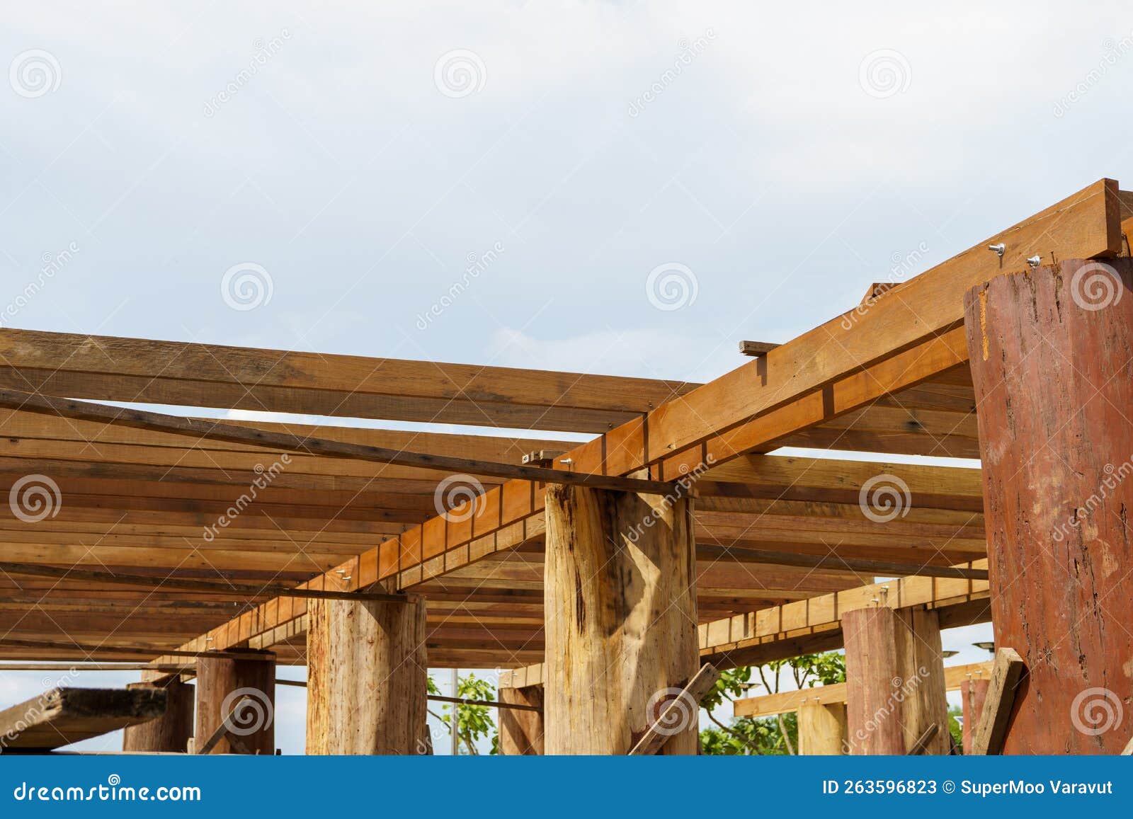A Wooden Frame Structure with Massive Supporting Pillars Prepares the ...