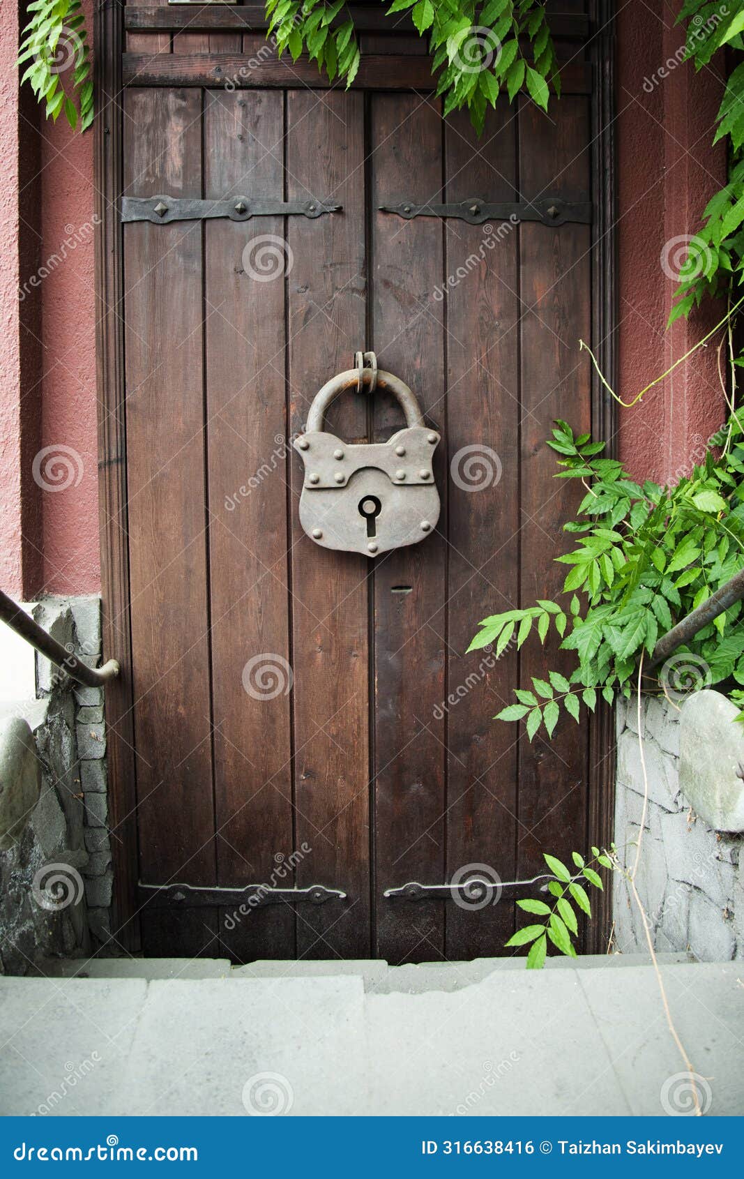 Wooden Gate with Large Hinged Iron Lock in the Village . Rustic Style ...