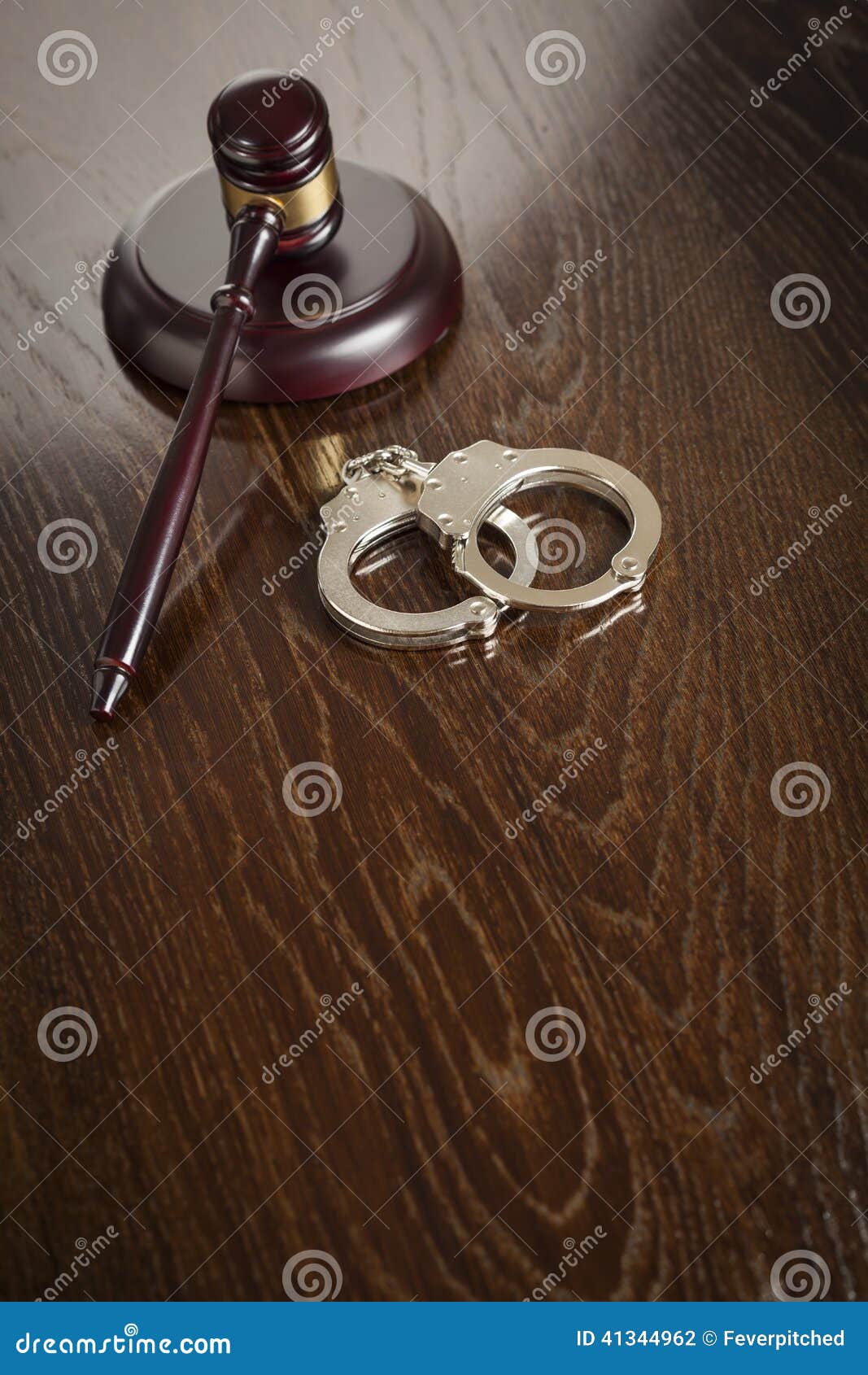 Wooden Gavel and Pair of Handcuffs on Table Stock Photo - Image of ...