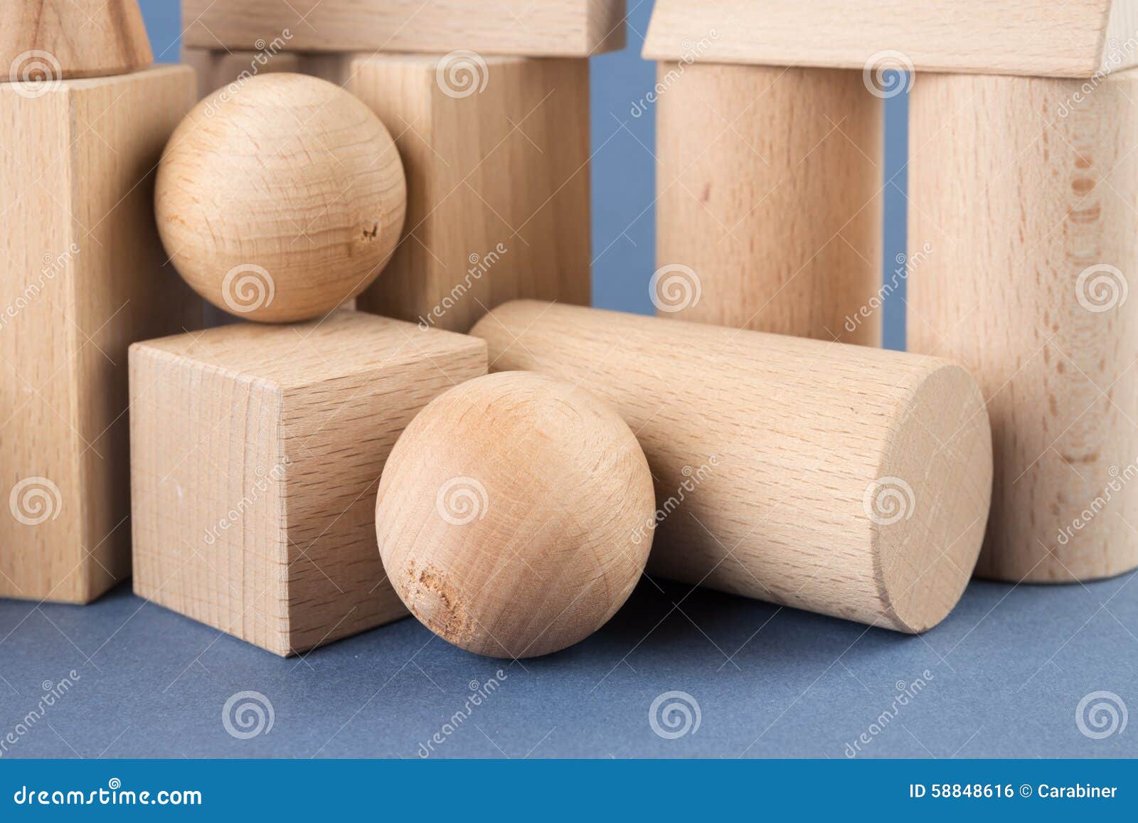 Wooden Geometric Shapes on a Blue Stock Photo - Image of blocks ...