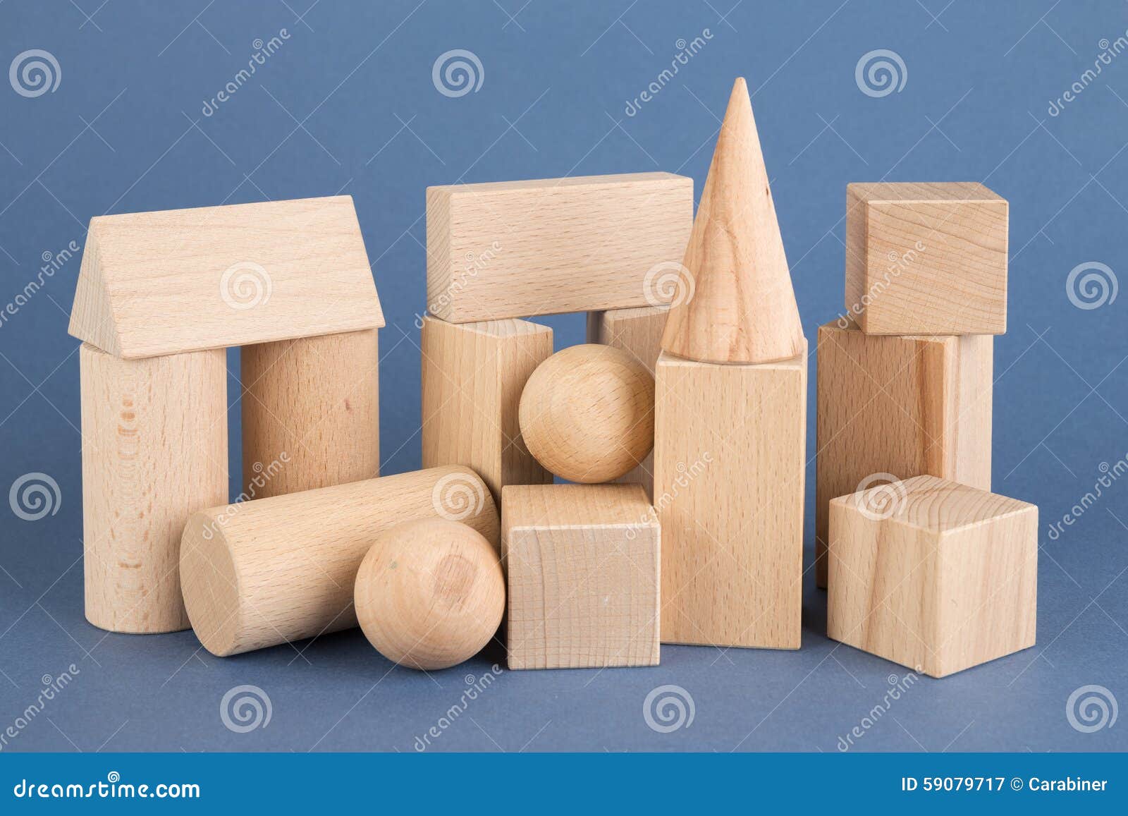 Wooden Geometric Shapes on a Blue Stock Image - Image of cone ...