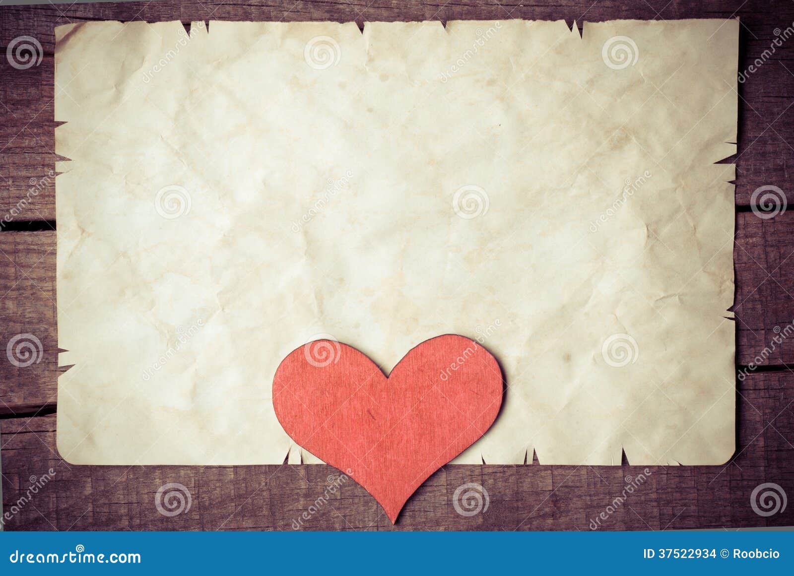 Wooden heart on old paper stock photo. Image of countryside - 37522934