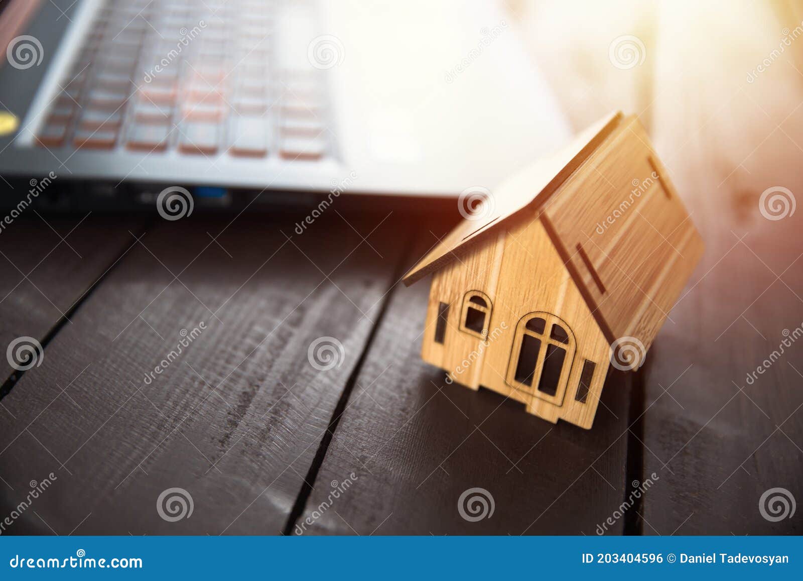 Wooden house with computer stock photo. Image of wooden - 203404596