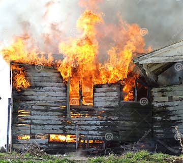Wooden house on fire stock image. Image of burns, incinerates - 6839213