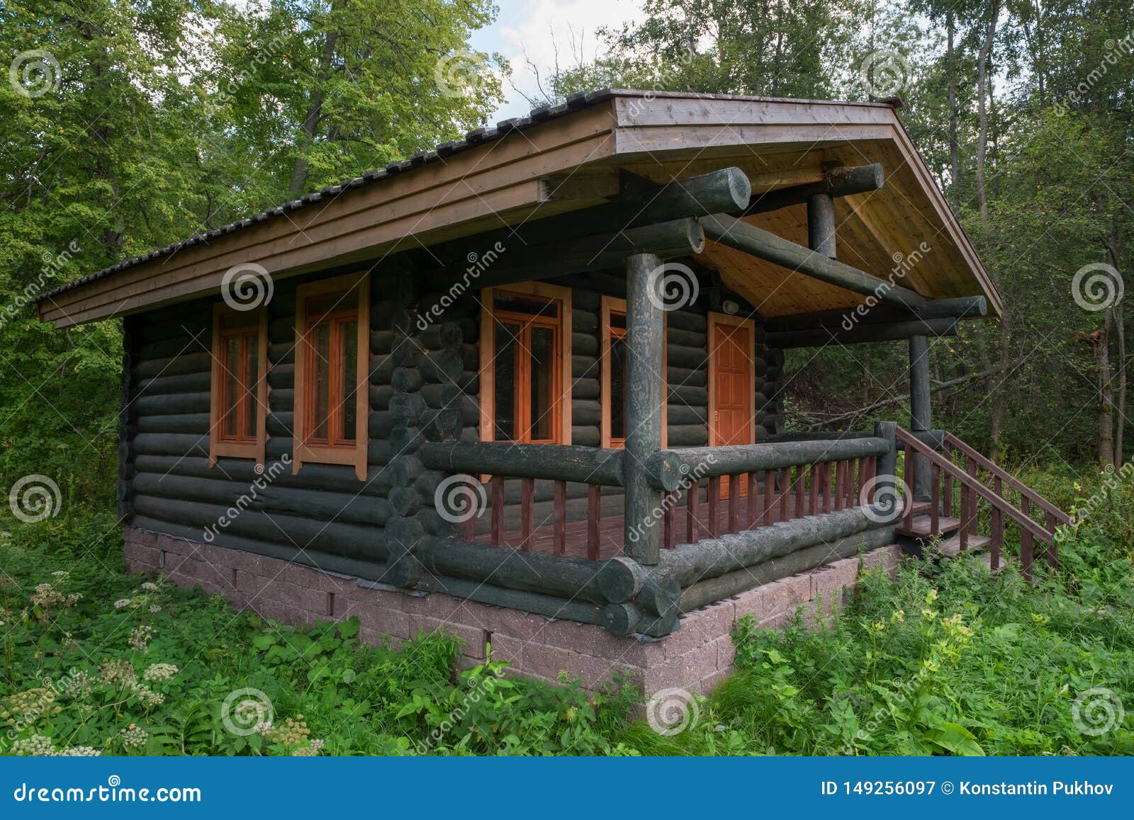 Wooden house in the forest stock image. Image of grass - 149256097