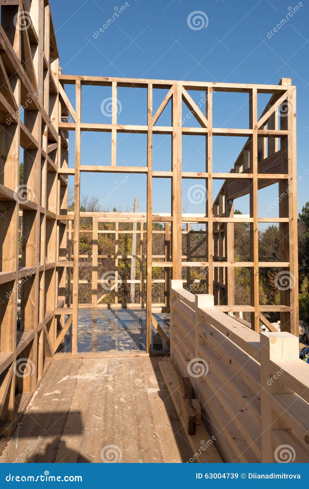 Wooden House Under Construction Stock Image - Image of blue, framing ...