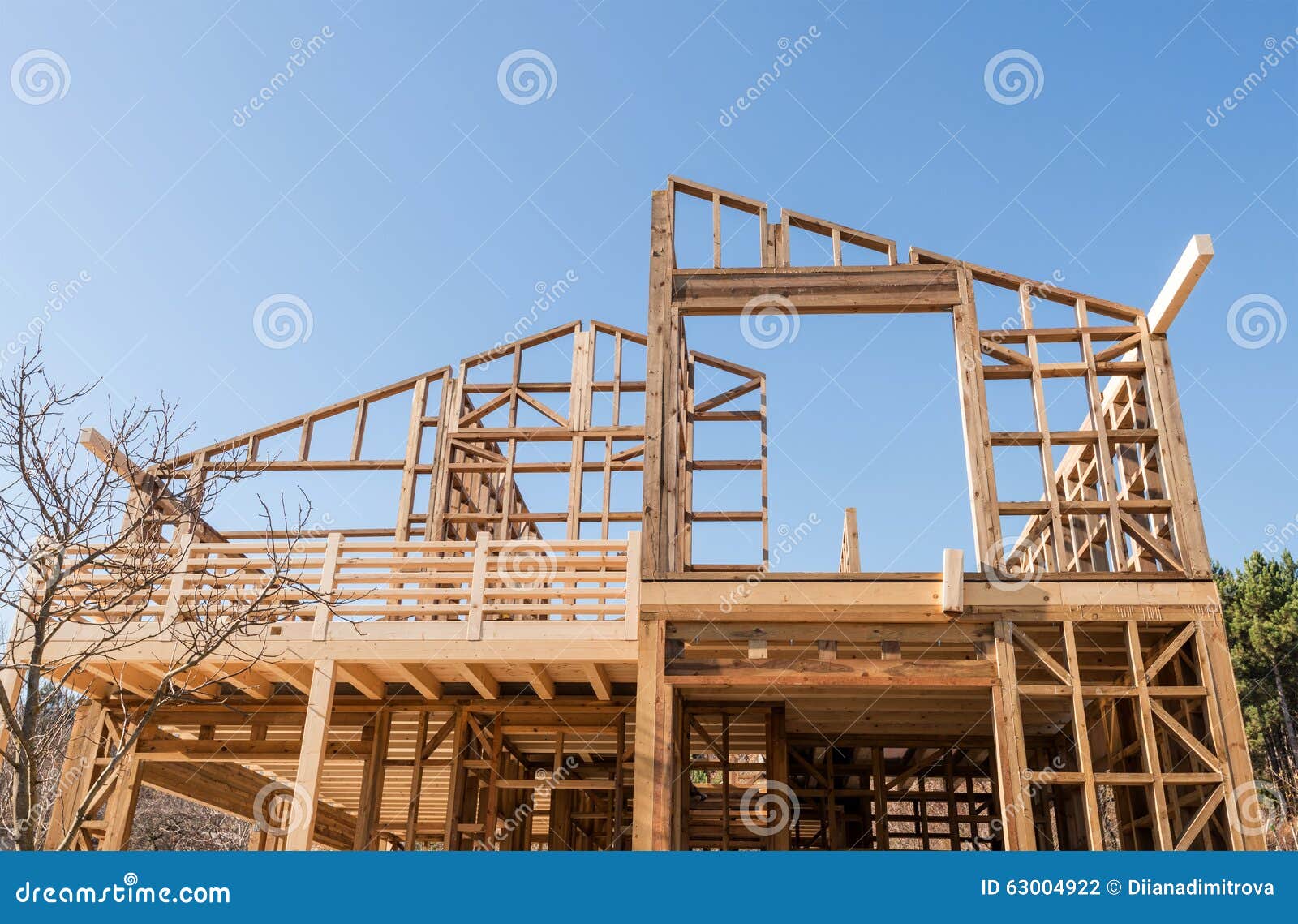 Wooden House Under Construction Stock Photo - Image of carpentry, site ...