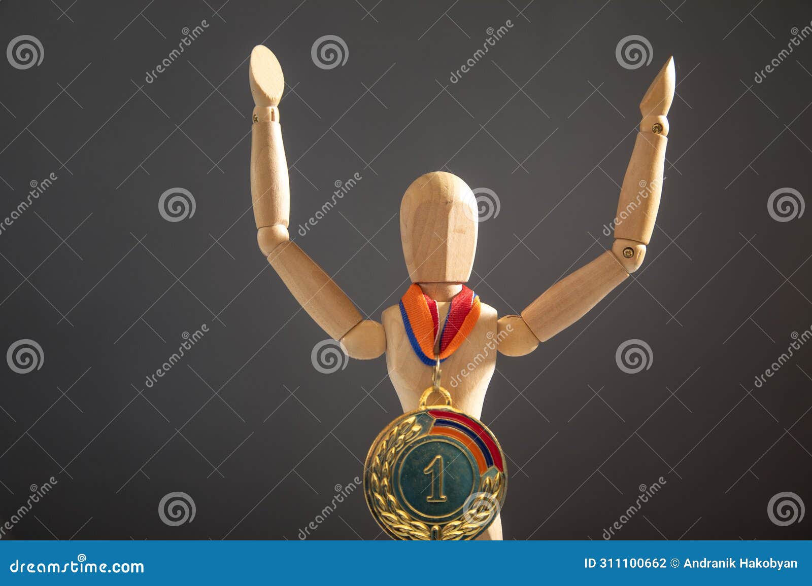 Wooden Human Figure with a Winner Medal Stock Photo - Image of ...