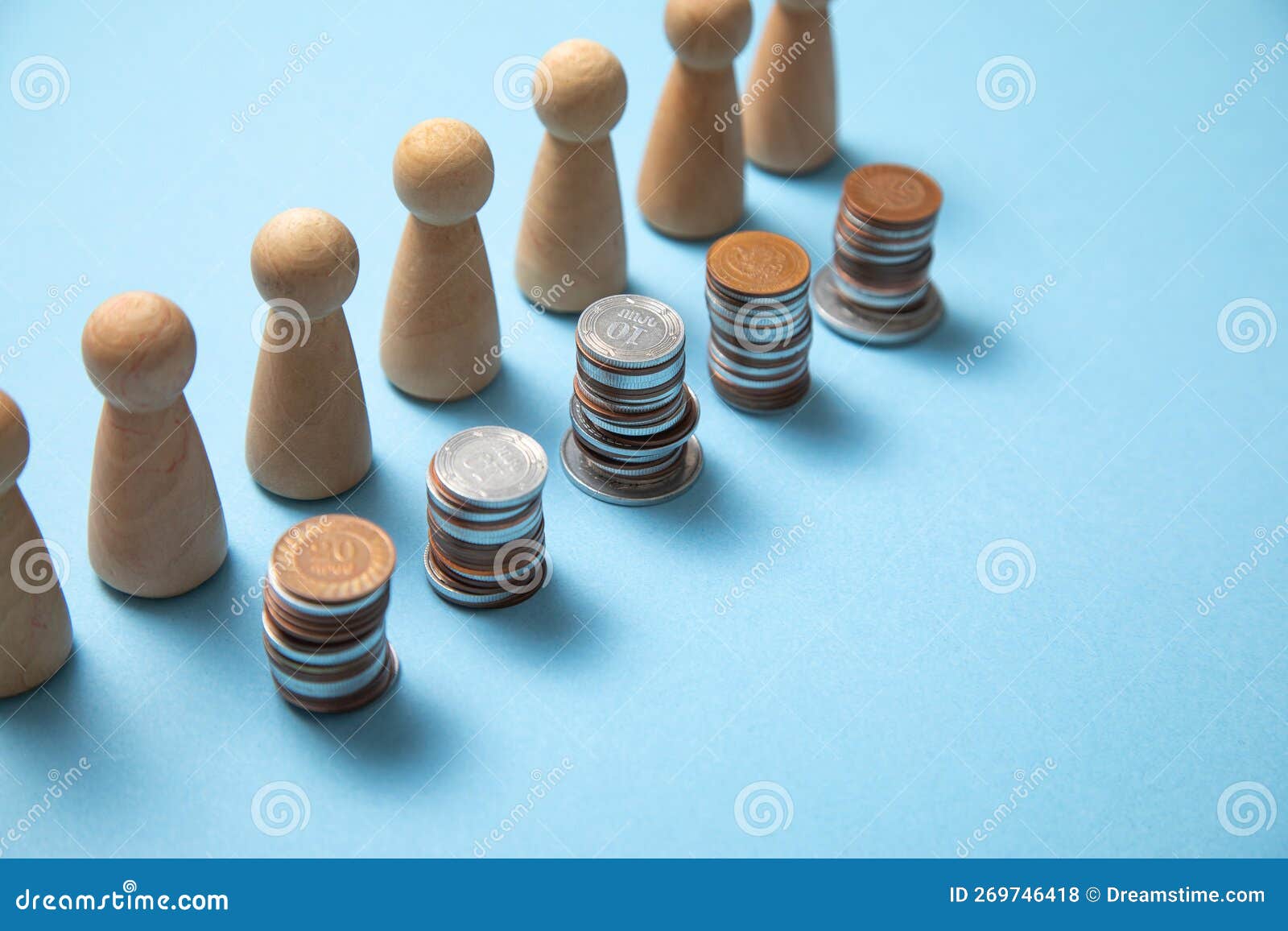 Wooden Human Figures with a Stack of Coins Stock Photo - Image of ...