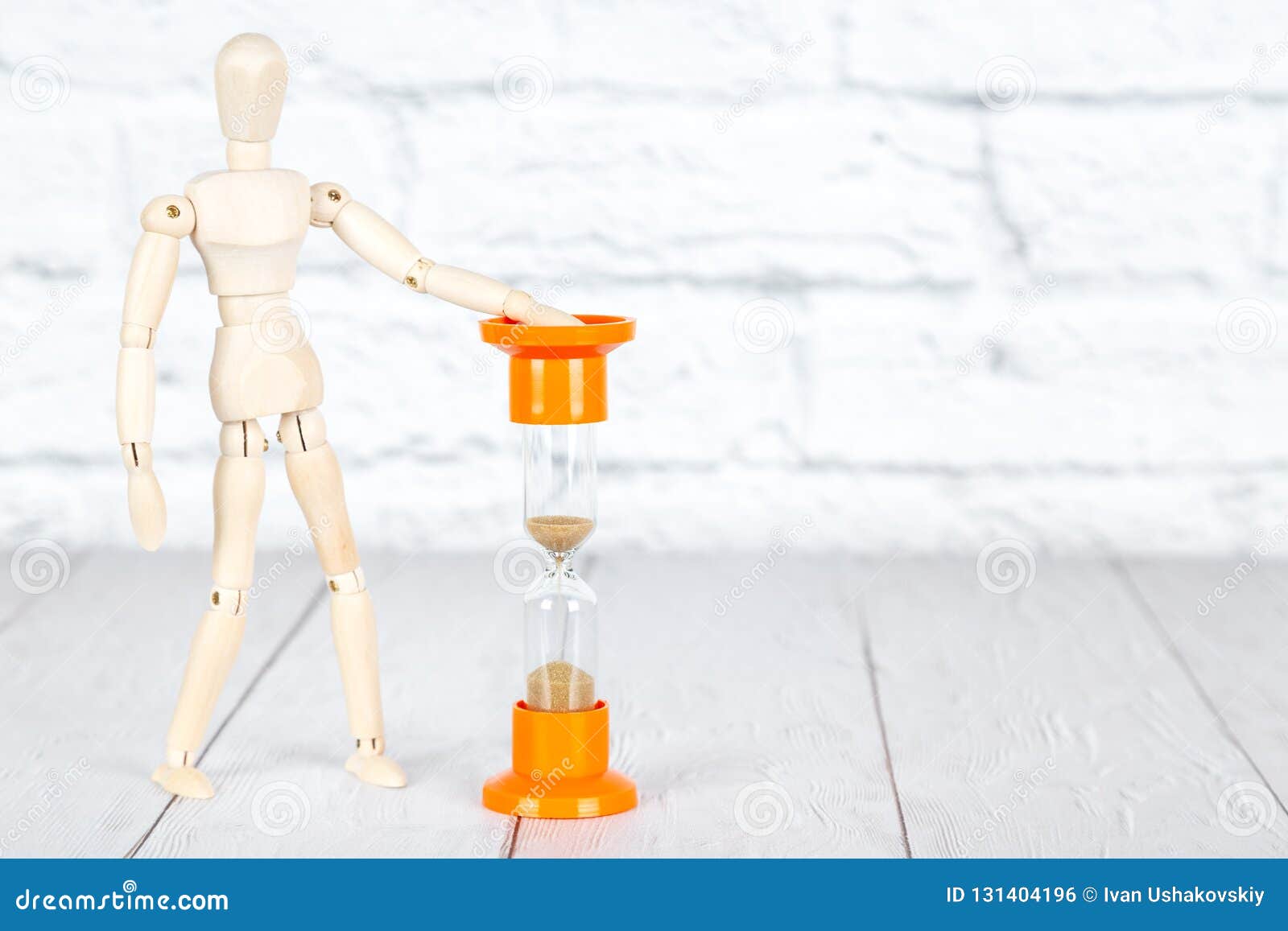 Wooden Human Puppet with Hourglass Stock Photo - Image of clock, space ...