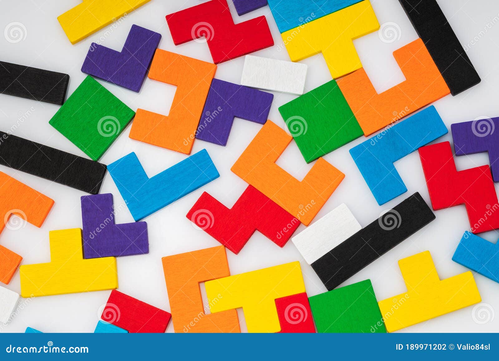 Wooden Intelligence Puzzle Pieces As Colourful Background Stock Photo ...