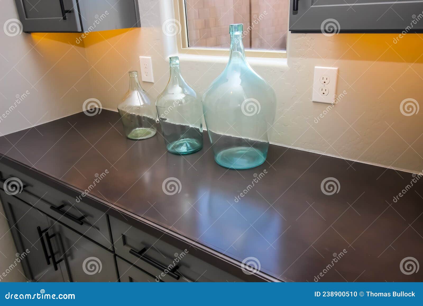 Wooden Kitchen Counter with Glass Bottles Stock Photo - Image of brown ...