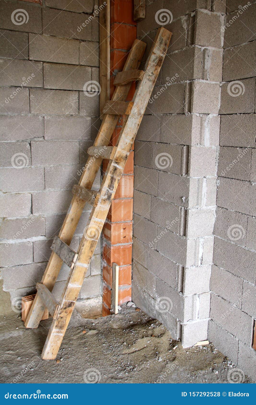 A Wooden Ladder and Bricks in a Construction Stock Photo - Image of ...