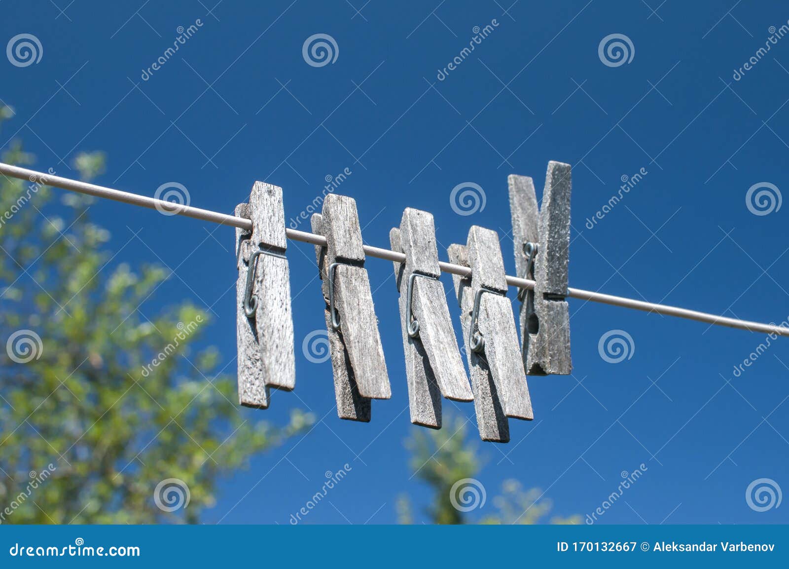 Wooden laundry clamps stock image. Image of blue, line - 170132667