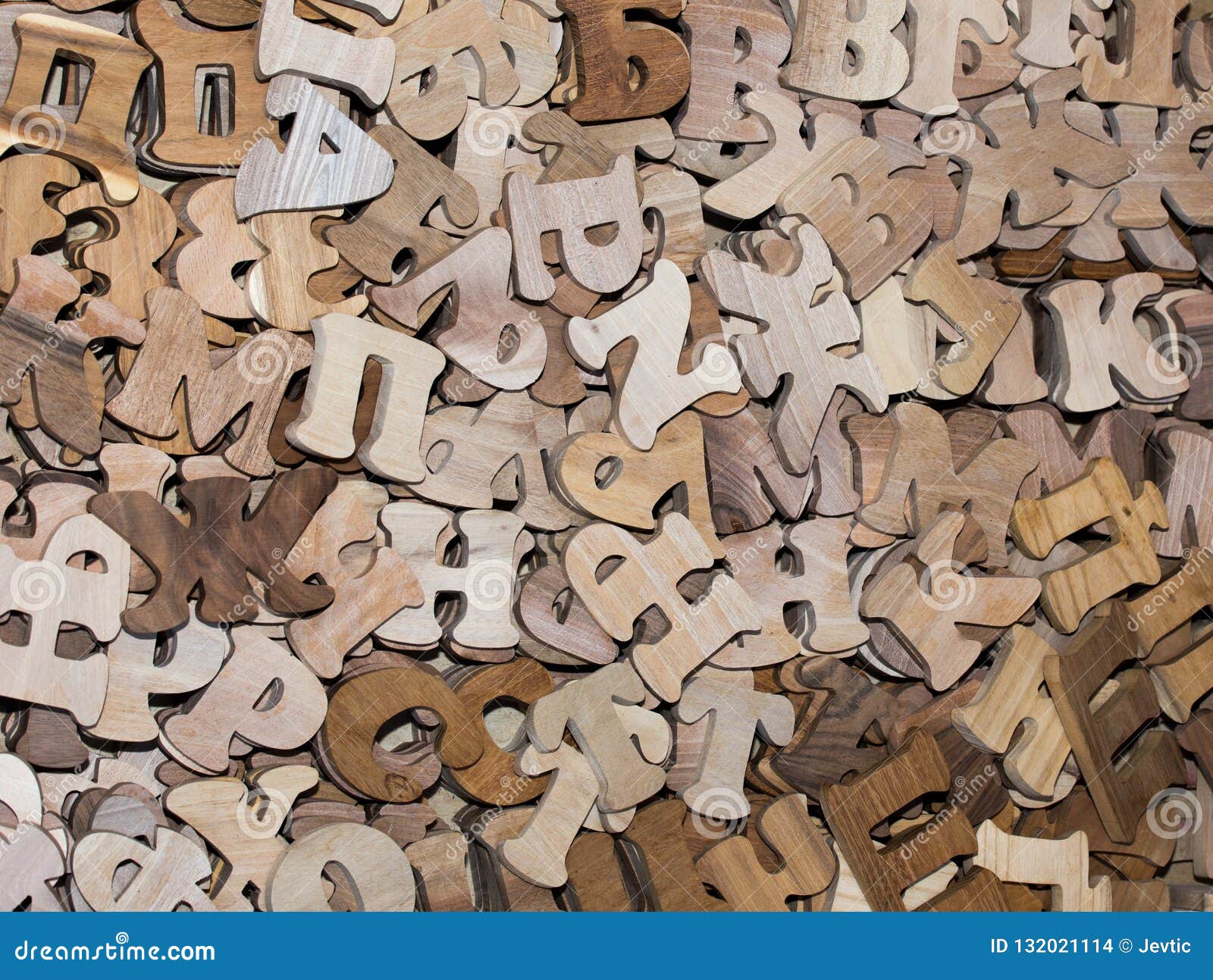 Wooden letters on pile stock photo. Image of typography - 132021114