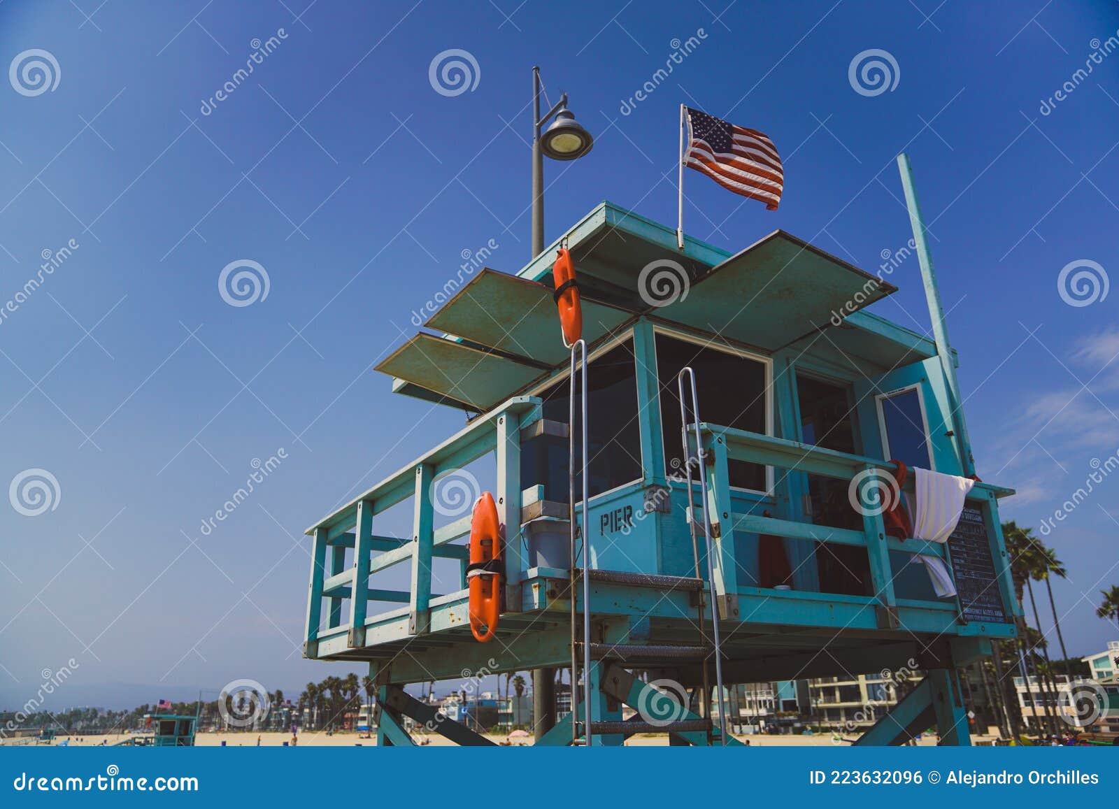 Wooden Lifeguard Structure at the Beach with a Flag Stock Photo - Image ...