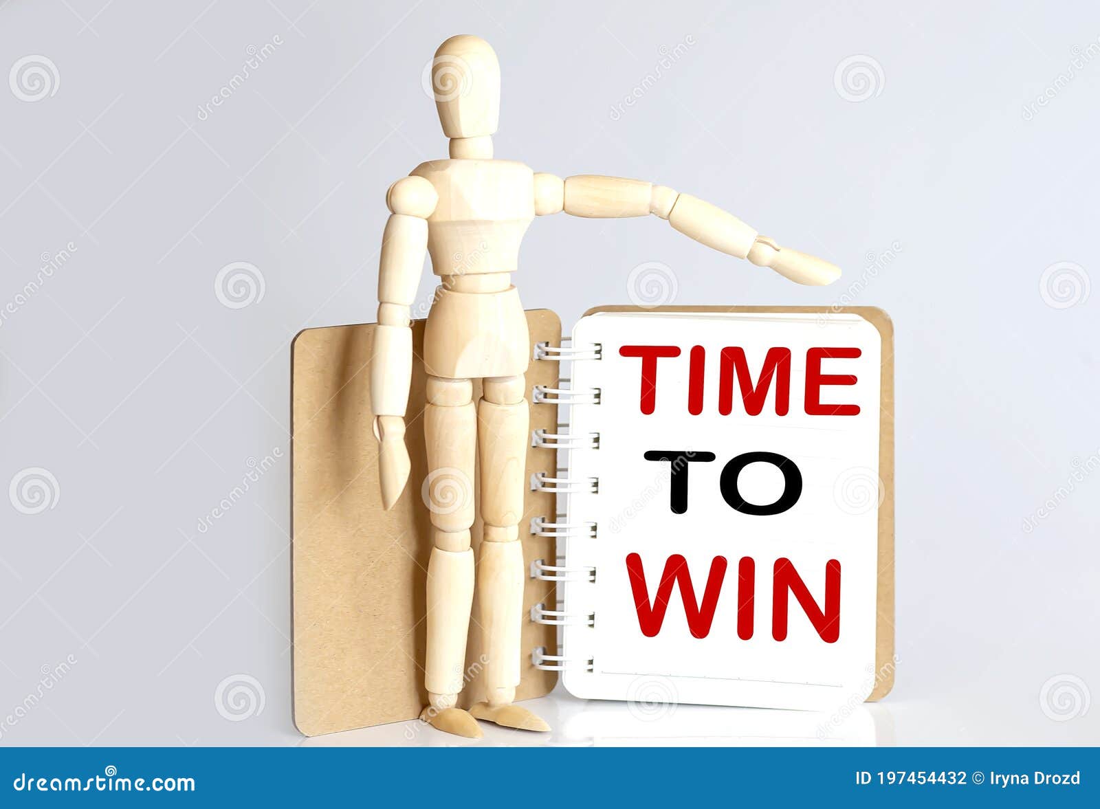 Wooden Man Shows with a Hand To White Notepad with Text Time To Win ...