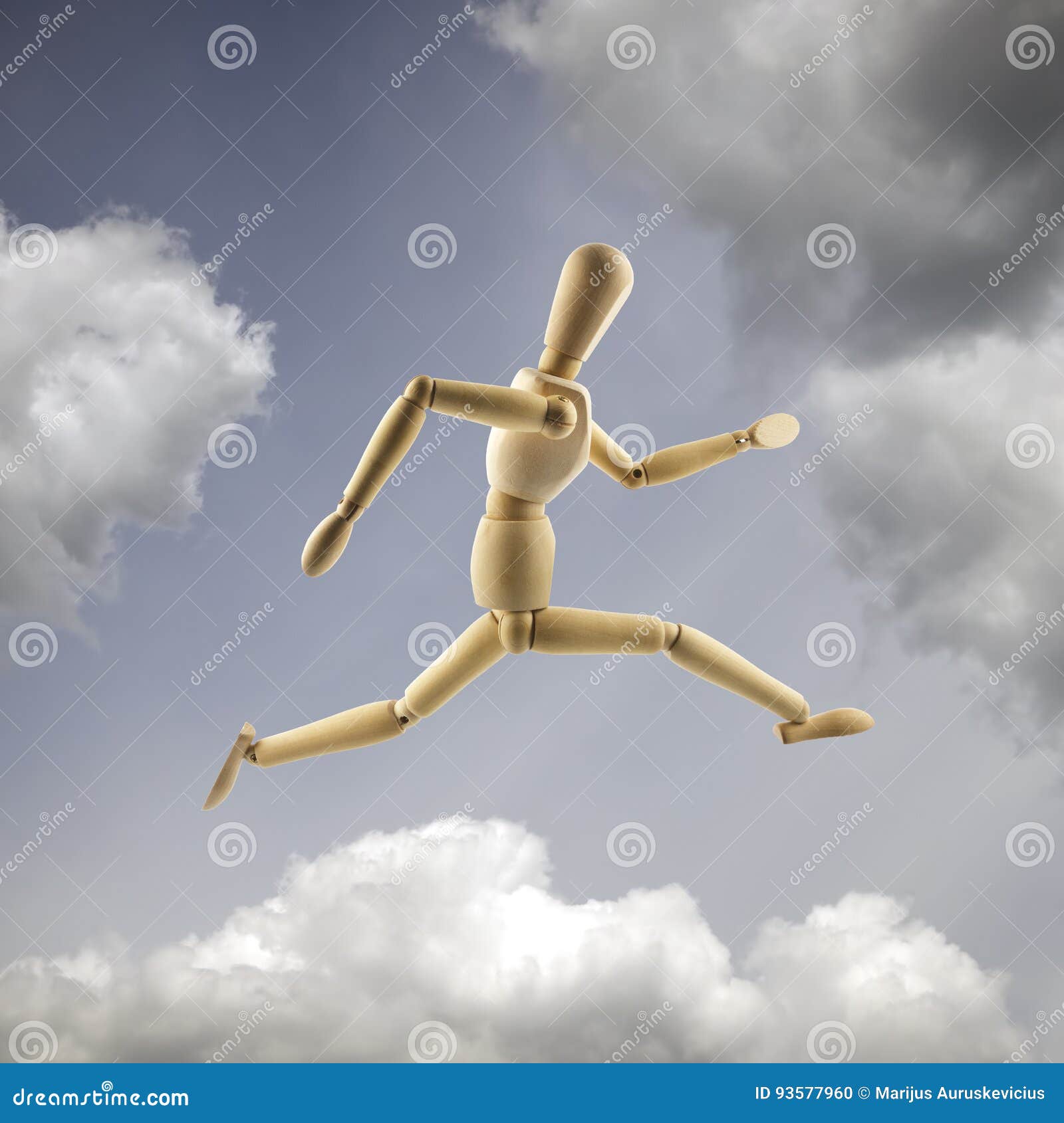 Wooden Mannequin in the Dramatic Sky. Running and Jumping Concept Stock ...
