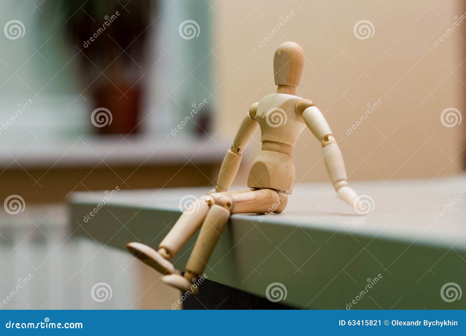 Wooden Mannequin or Man Figurine Sitting on White Stock Image - Image ...